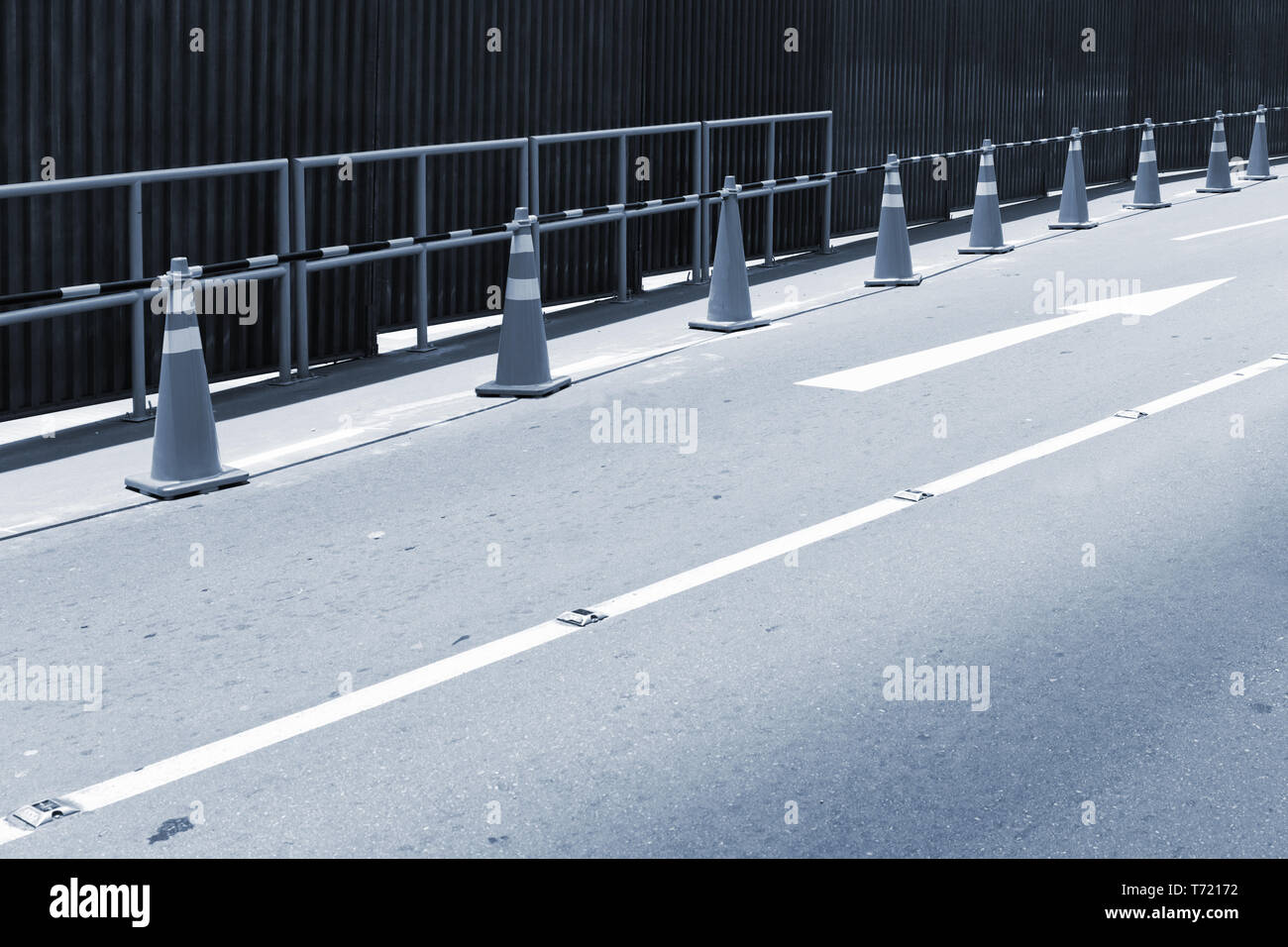 fence on the road Stock Photo - Alamy