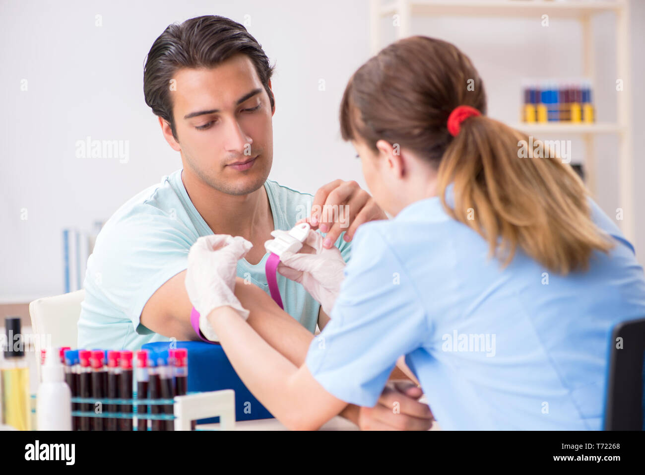 Young patient during blood test sampling procedure Stock Photo - Alamy
