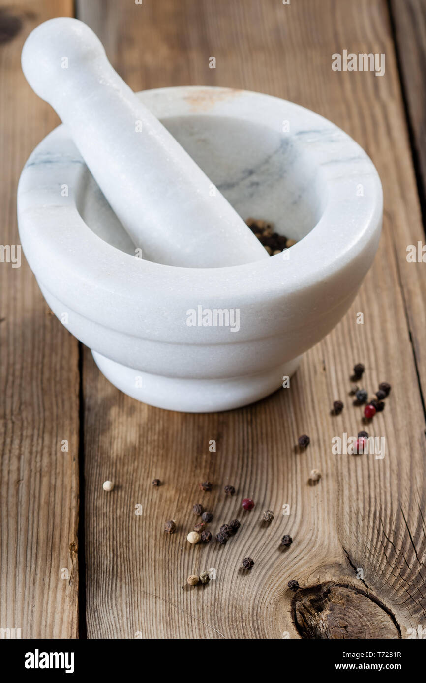 Mortar with spices Stock Photo - Alamy