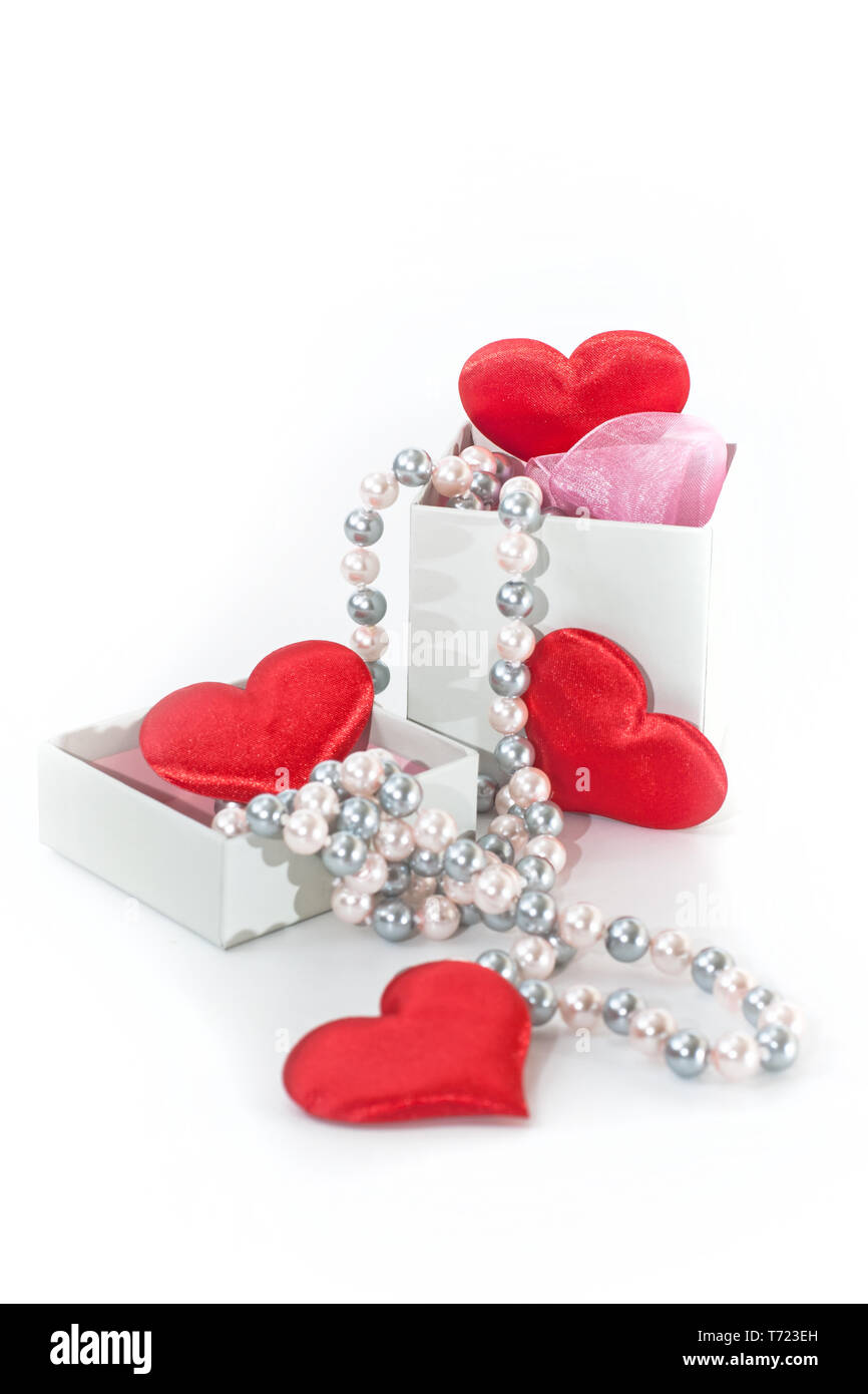 Grey gift box with pink ribbon Stock Photo - Alamy