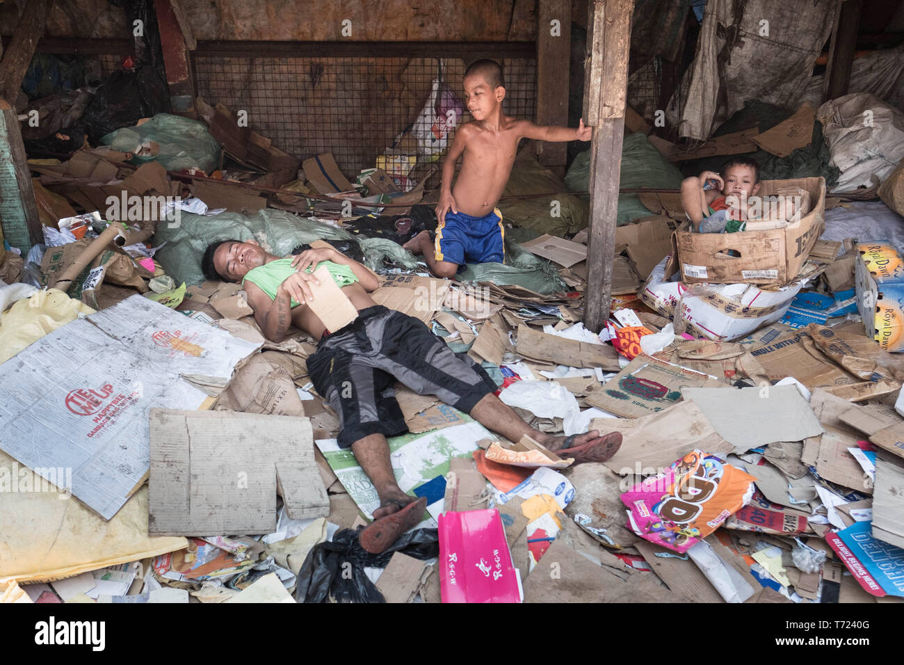 Children living in Tondo, north west Manila in the Philippines and one ...
