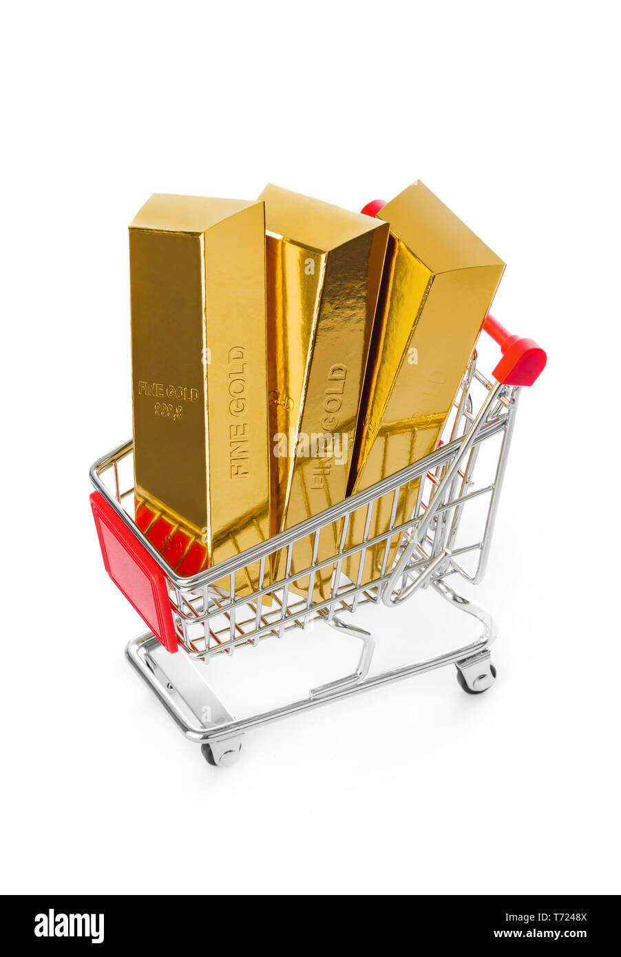 Gold in shopping cart Stock Photo - Alamy