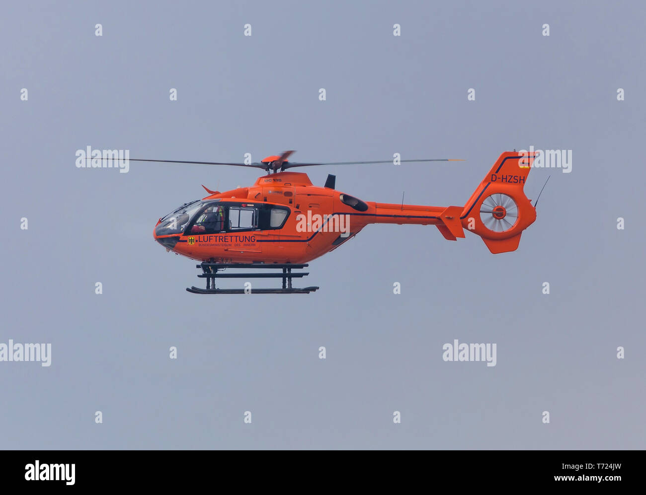 german rescue helicopter mid air Stock Photo - Alamy