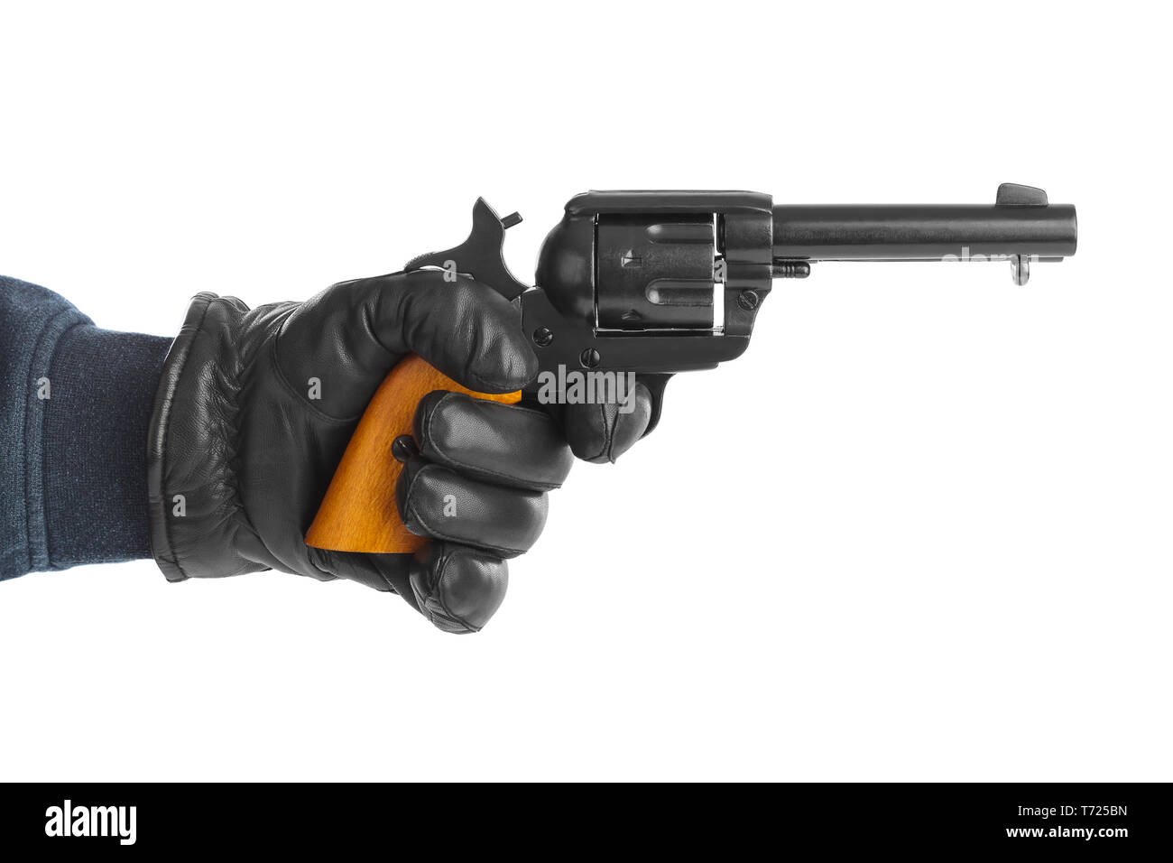 Hand with revolver Stock Photo - Alamy