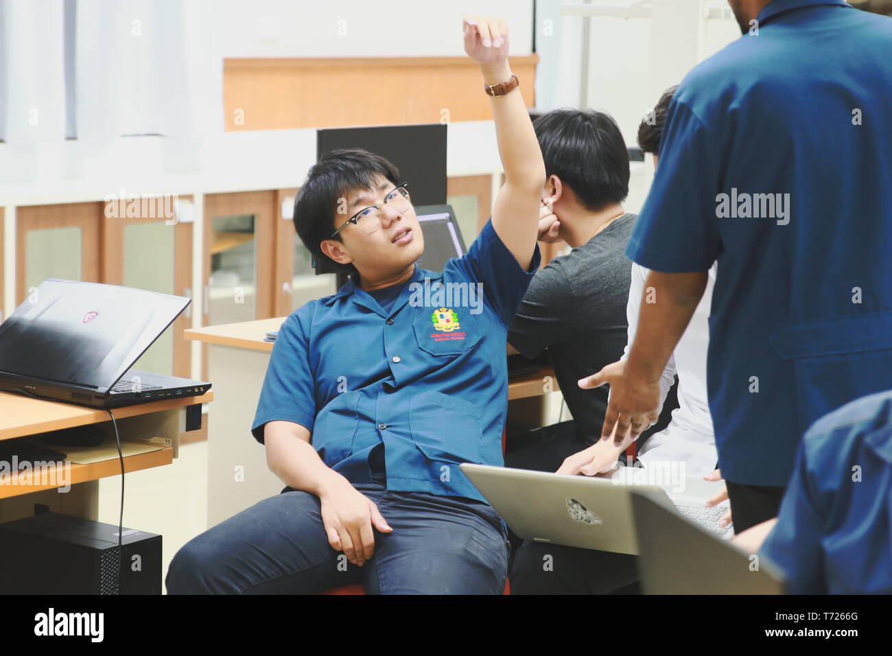 Two Thai Computer engineering student discussing about their project in ...