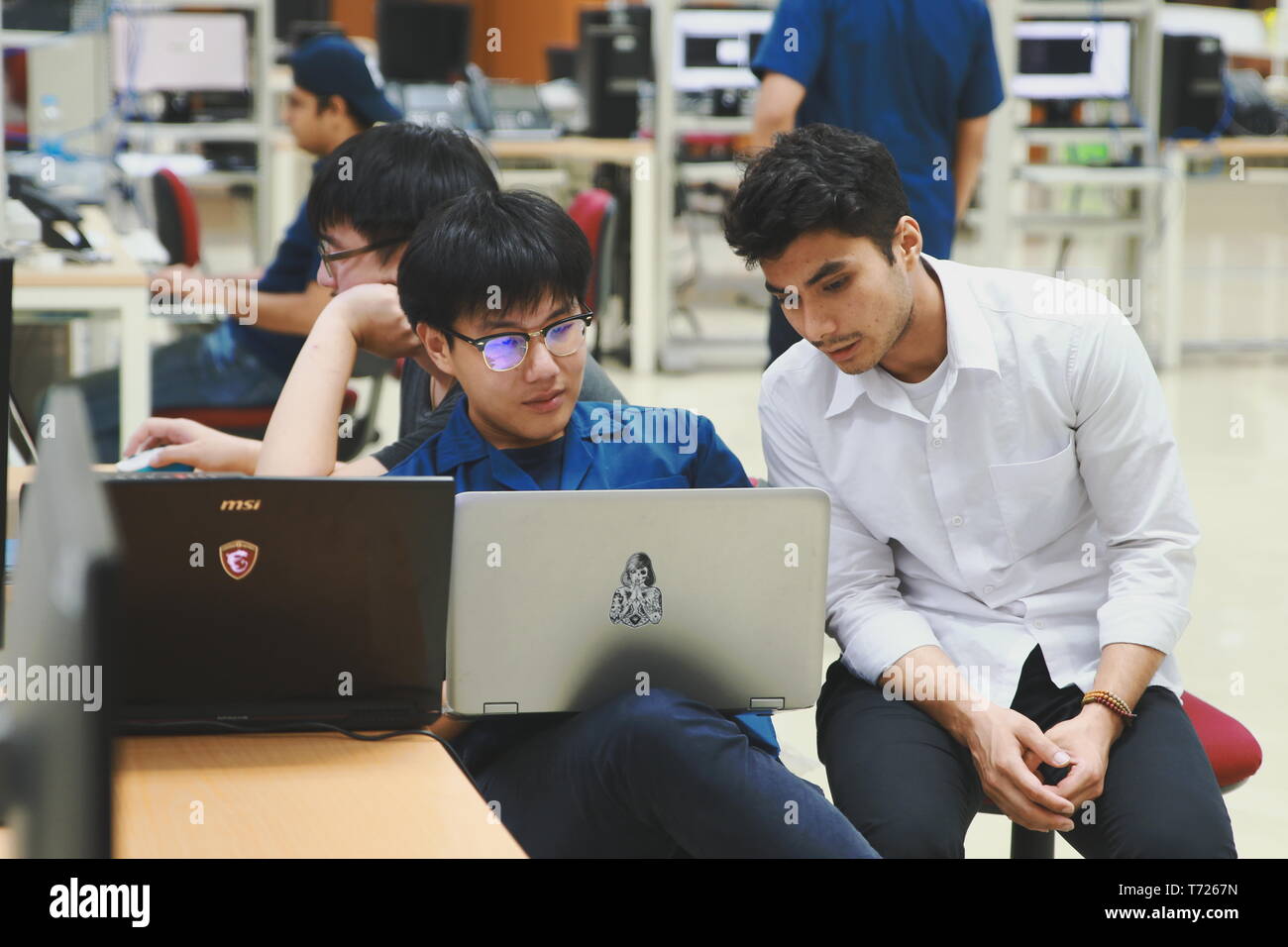 College students asia discuss hi-res stock photography and images - Alamy