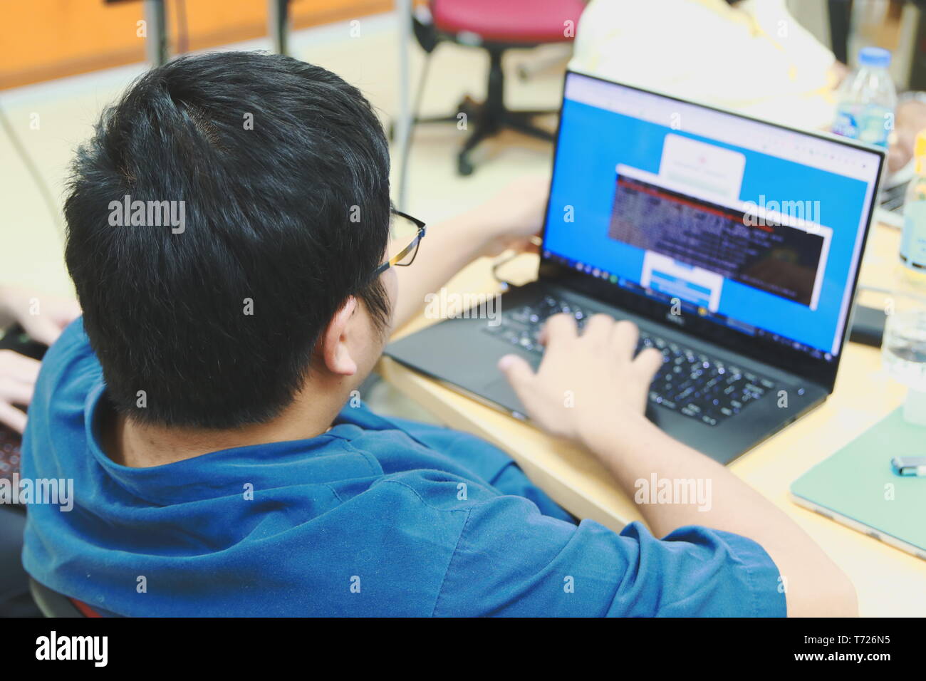 Back of a Computer Engineering student at Assumption University working ...