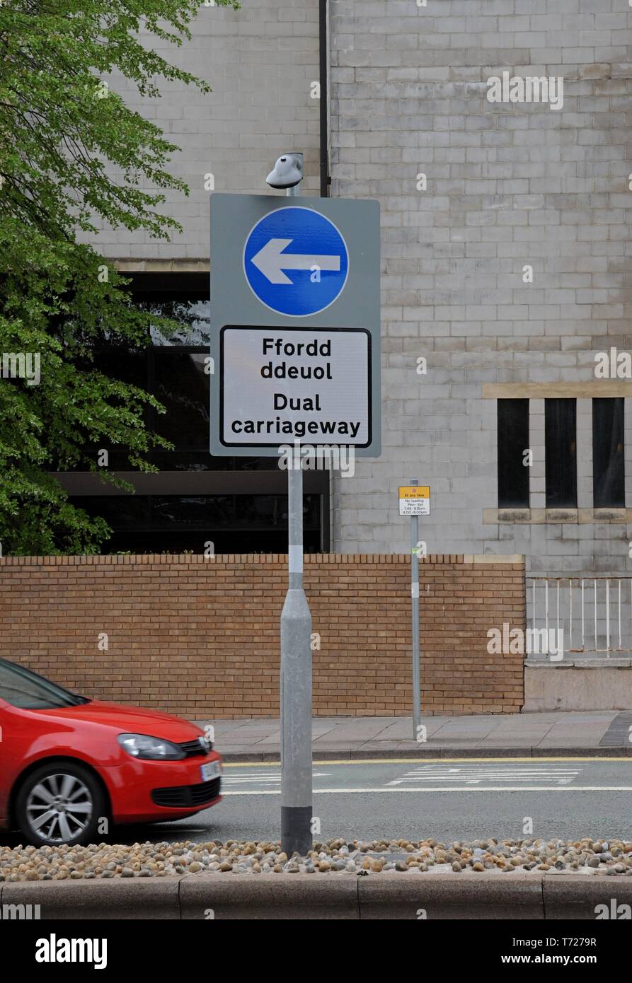 A Bi lingual road sign in Cardiff in English and Welsh Stock Photo - Alamy