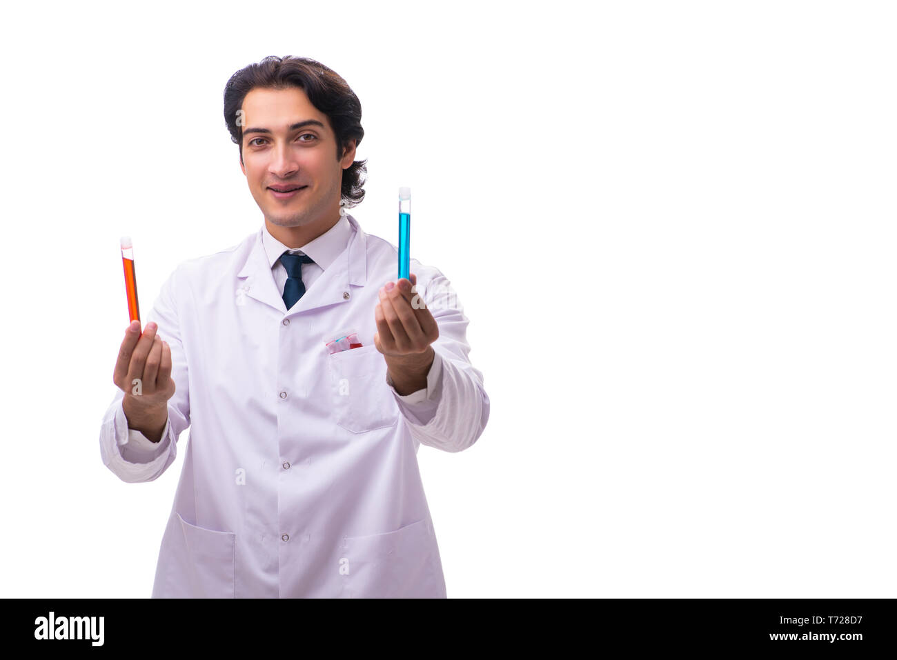 Happy young chemist mixing hi-res stock photography and images - Alamy