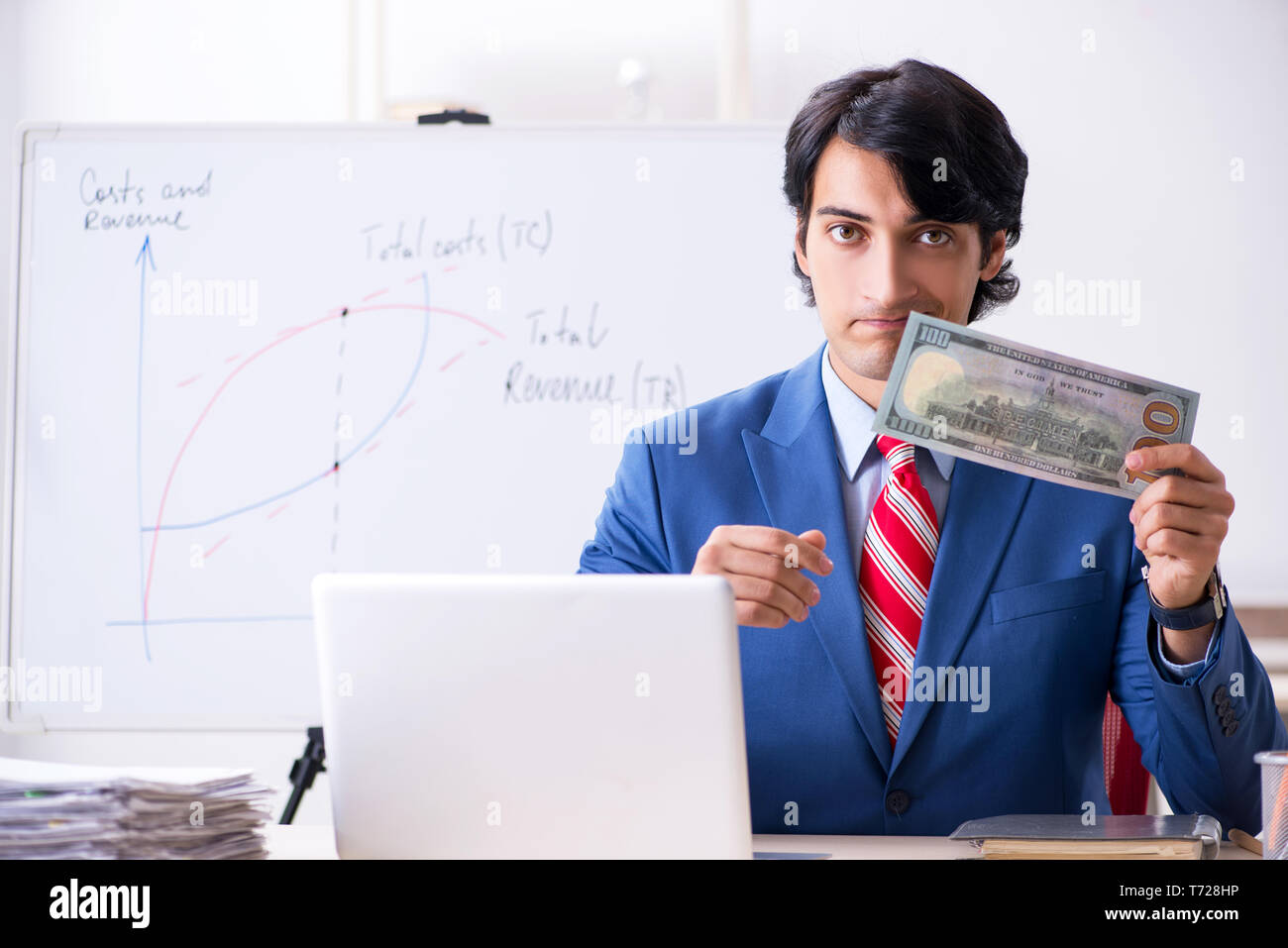 Company employee explaining charts presentation hi-res stock ...