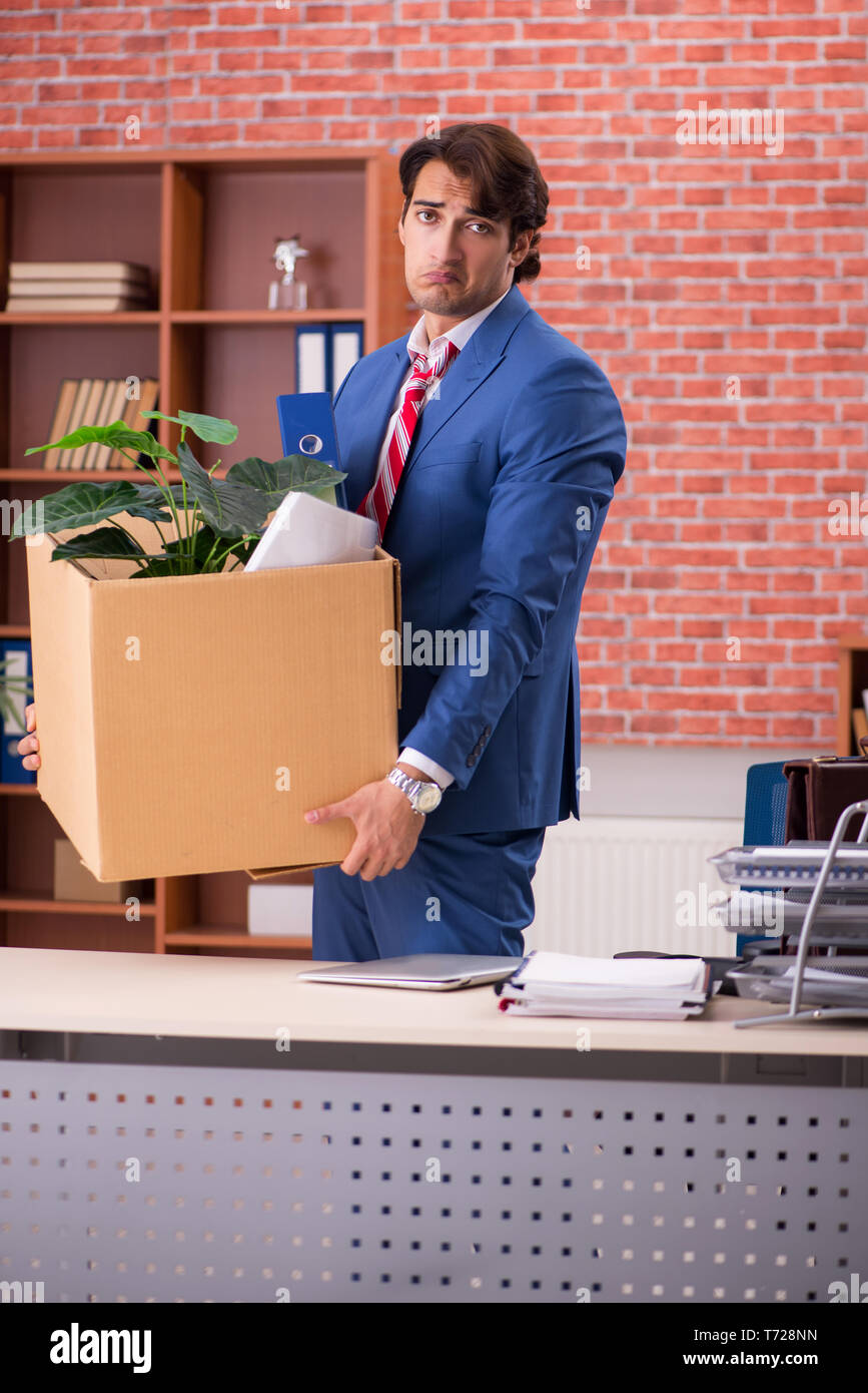 Young person being fired from his work Stock Photo - Alamy