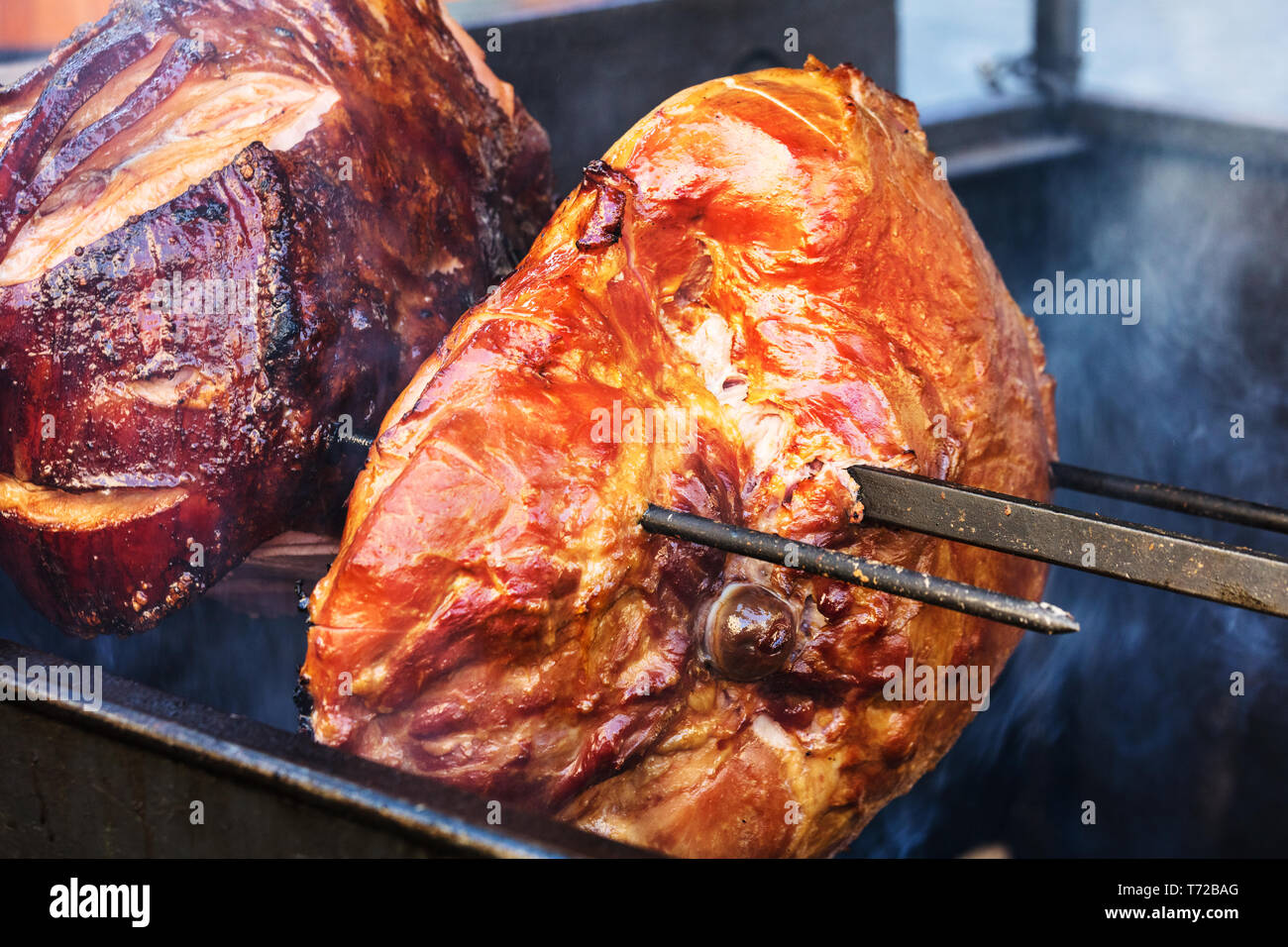 Pig cooking over open fire hi-res stock photography and images - Alamy