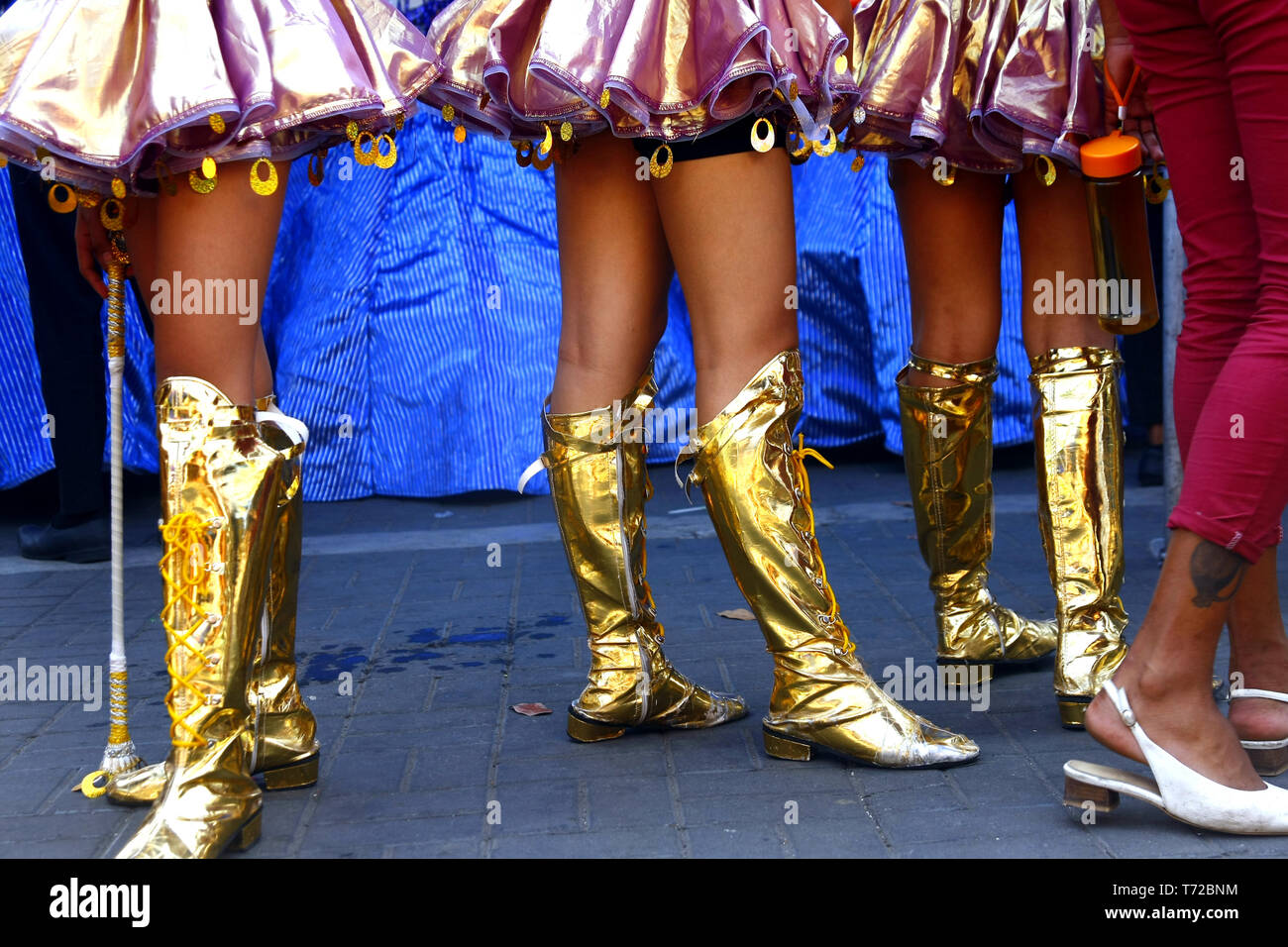 Photo of colorful costumes, attire and props of parade participants ...