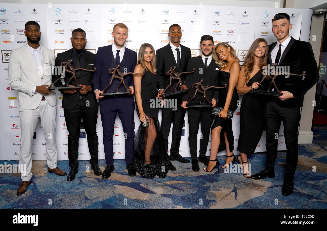 Barnsley's Dimitri Cavare (second left), goalkeeper Adam Davies, Ethan ...