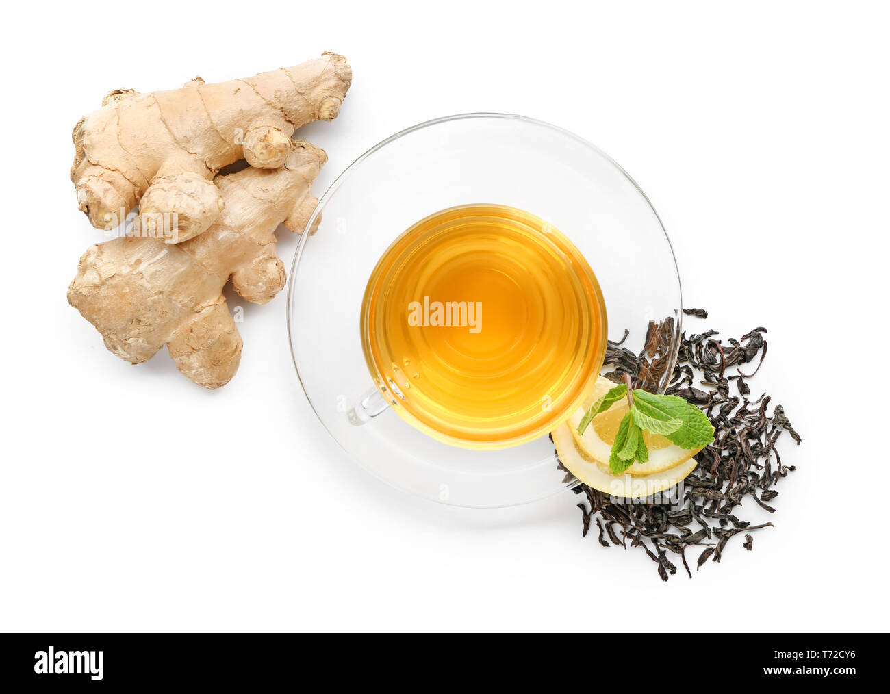 Cup of delicious tea with ginger and lemon on white background Stock ...