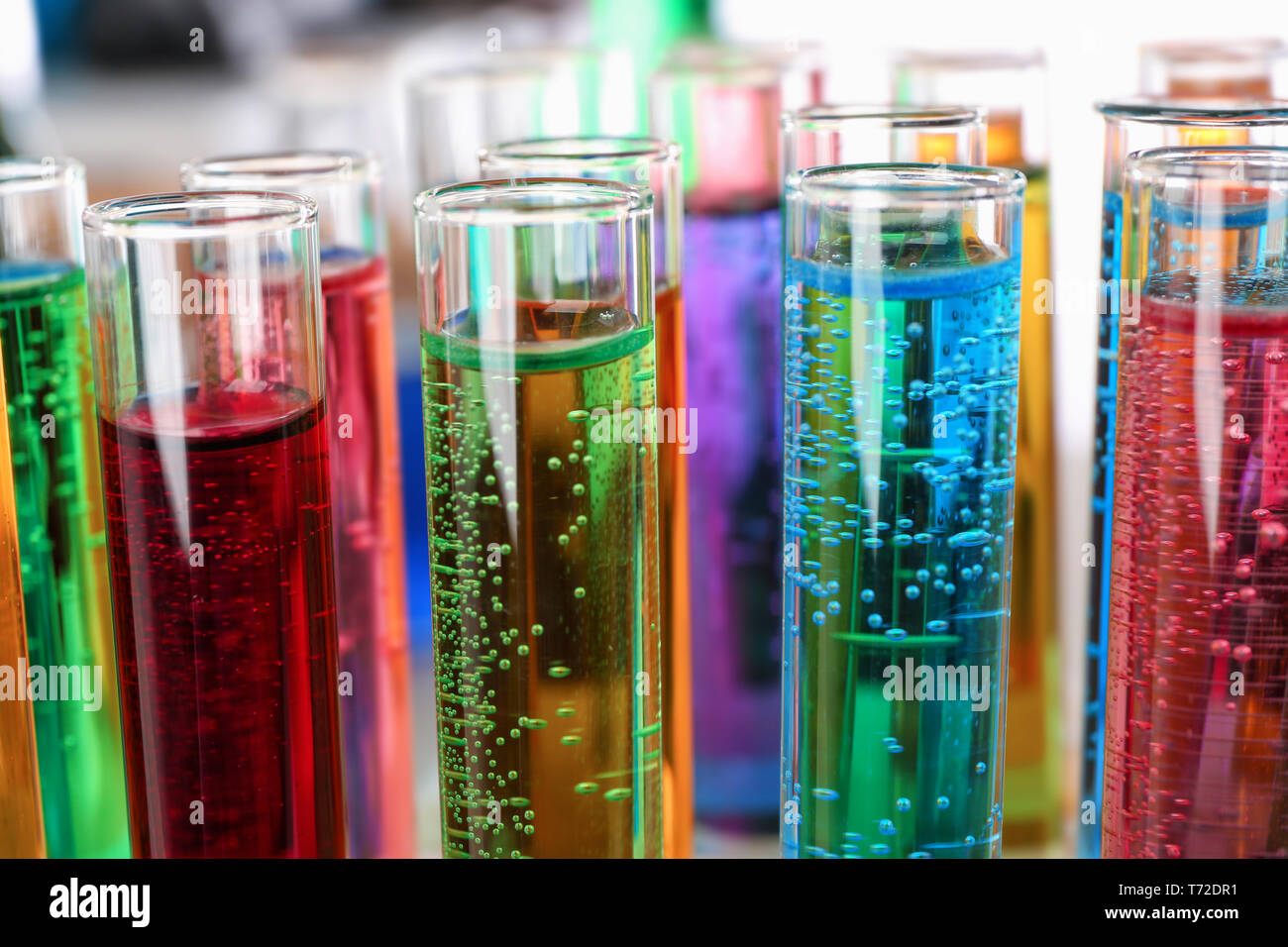 Many test tubes with colorful liquids, closeup Stock Photo - Alamy