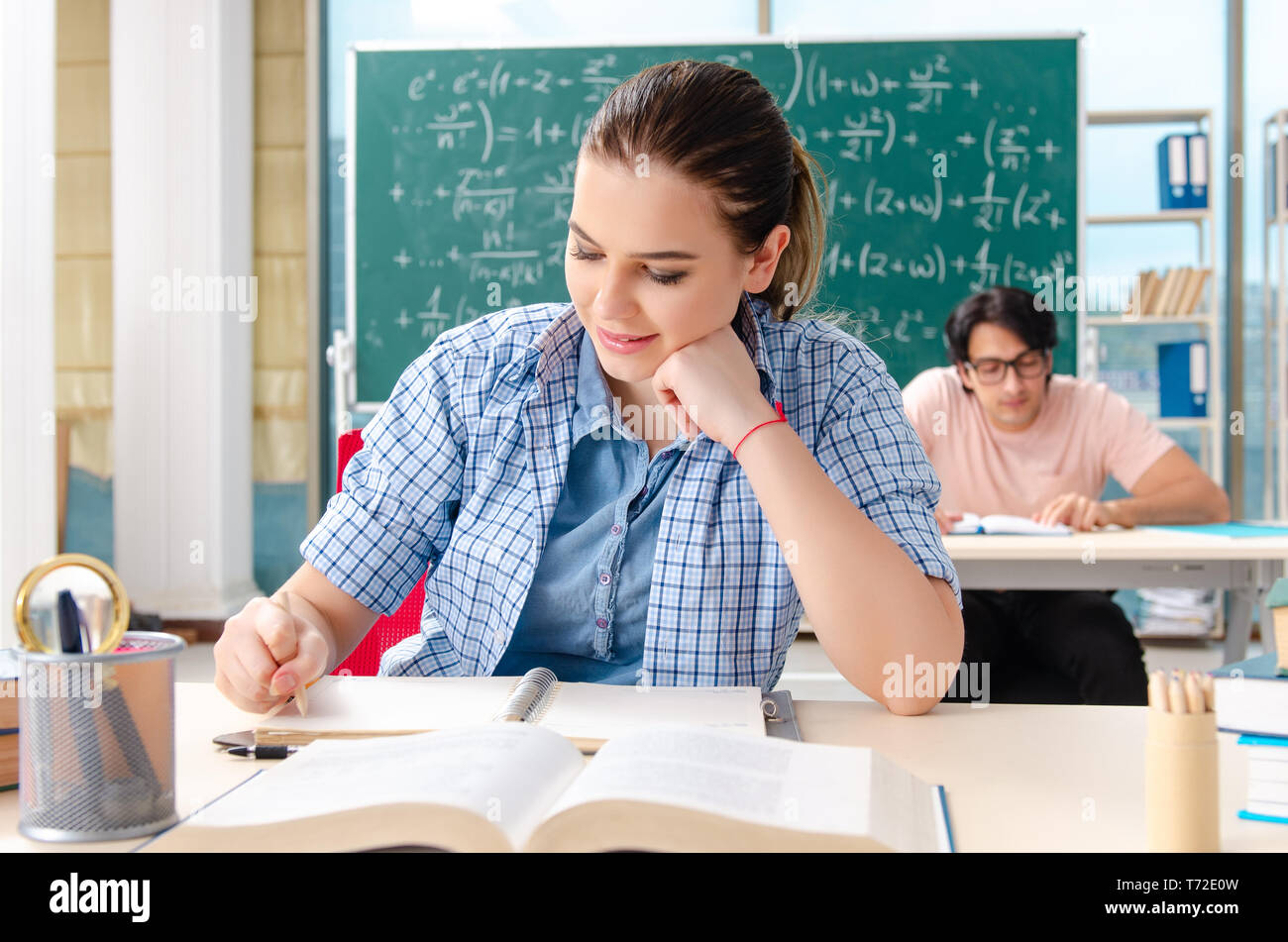 Young students taking the math exam in classroom Stock Photo - Alamy