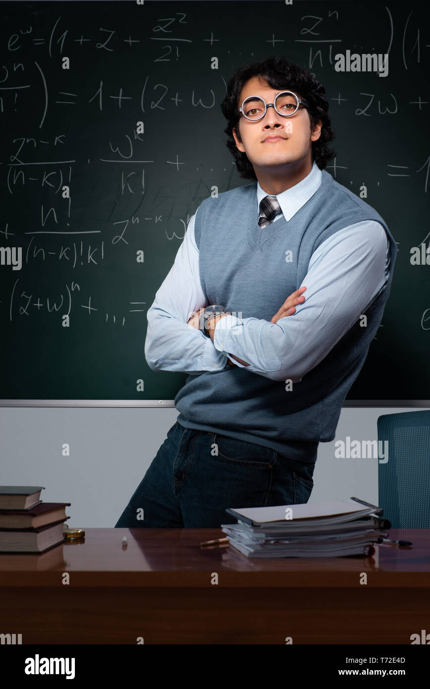 Man in front of blackboard math hi-res stock photography and images - Alamy
