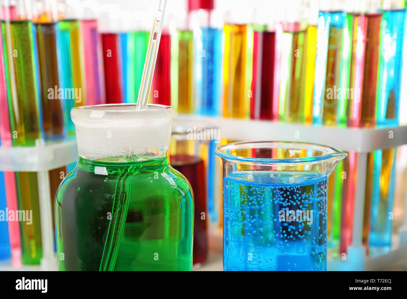 Beaker, flasks and test tubes with colorful liquids, closeup Stock ...