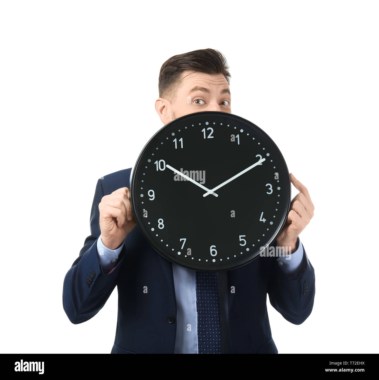 Businessman with clock on white background. Time management concept ...