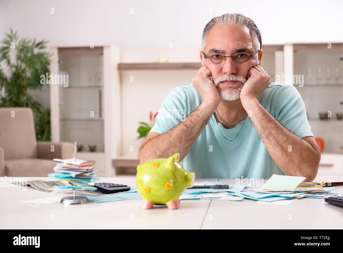 White bearded old man in budget planning concept Stock Photo - Alamy