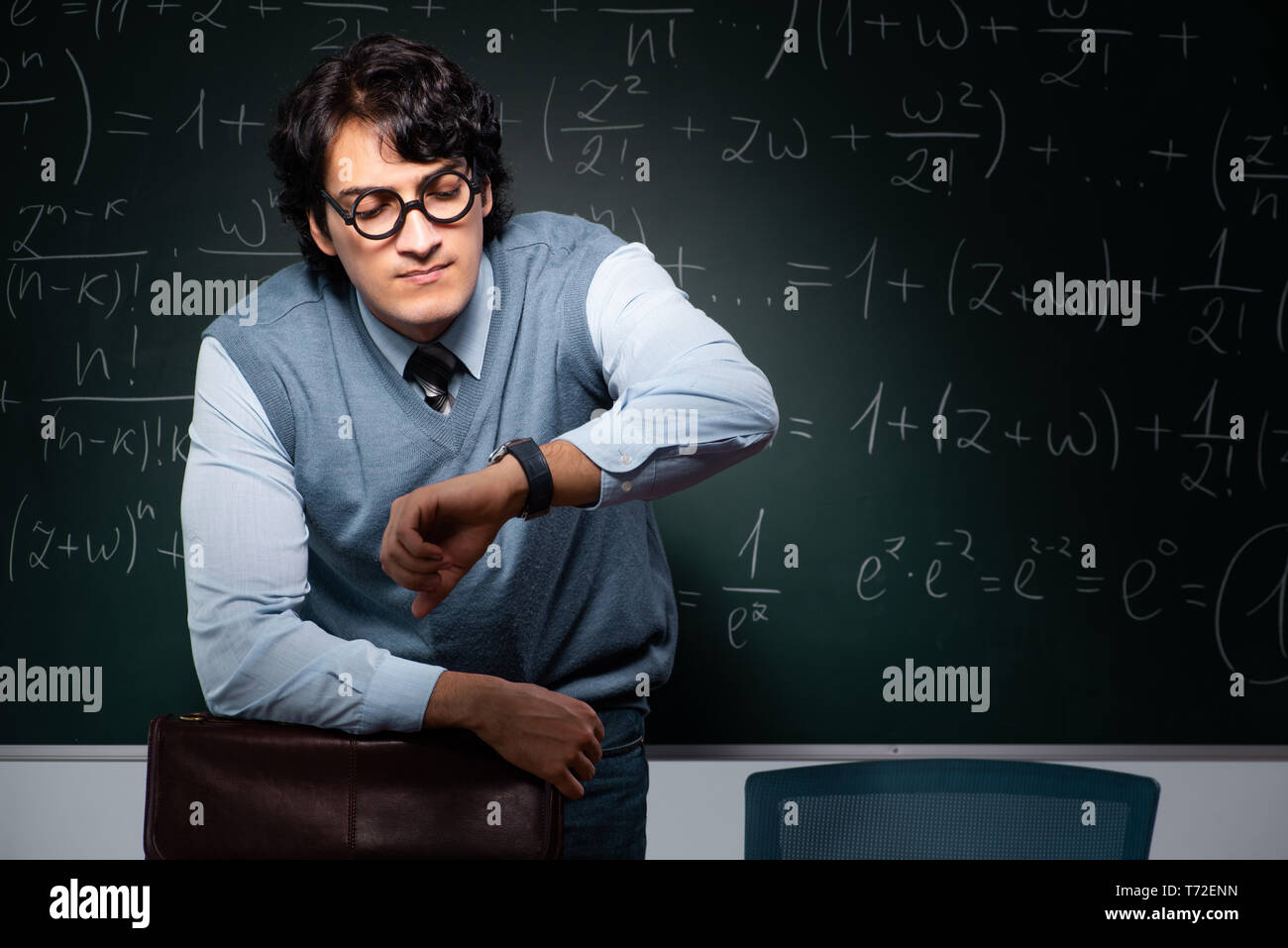 Late to class looking at watch hi-res stock photography and images - Alamy