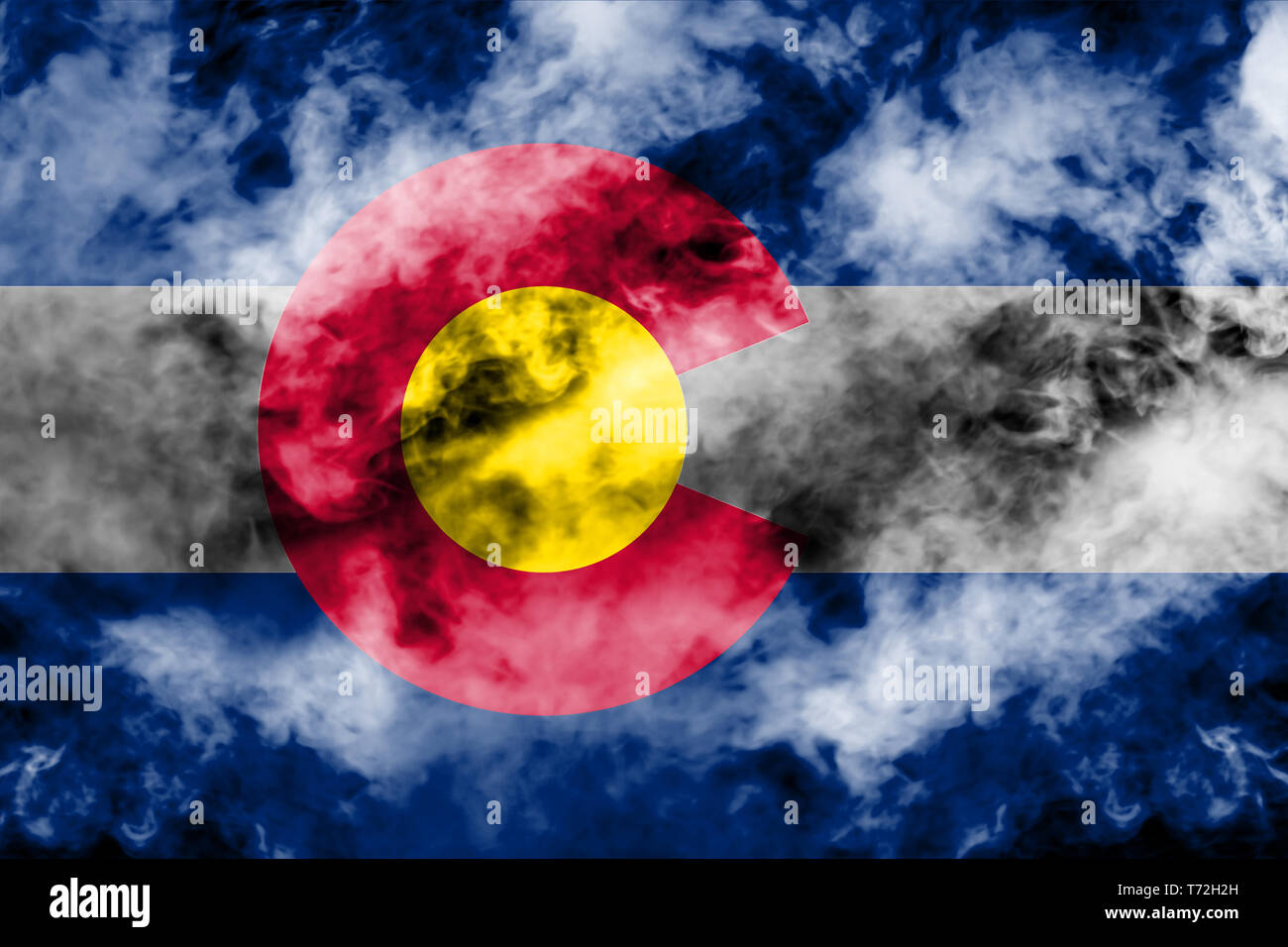 The national flag of the US state Colorado in against a gray smoke on ...