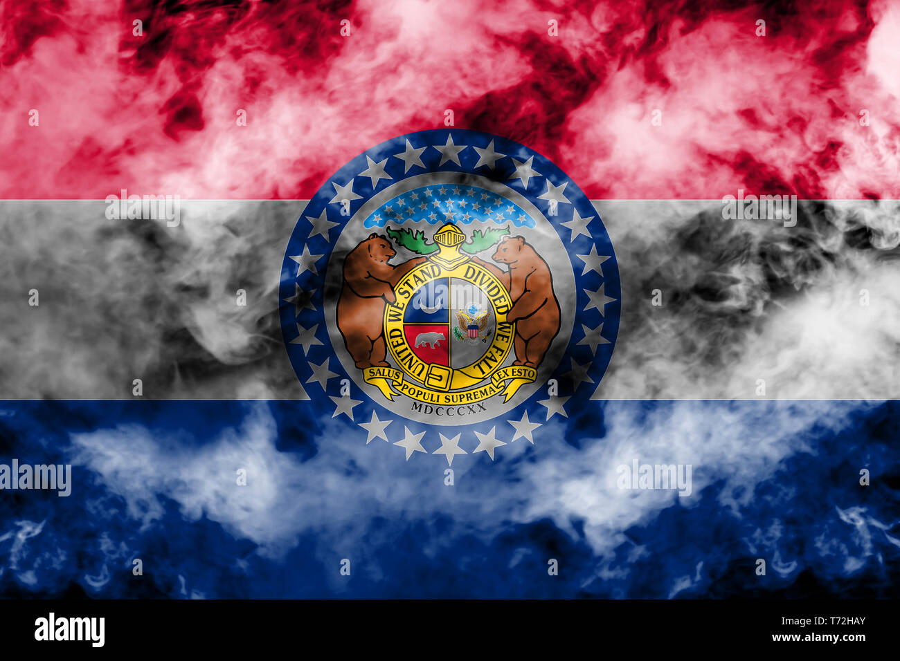 The national flag of the US state Missouri in against a gray smoke on ...
