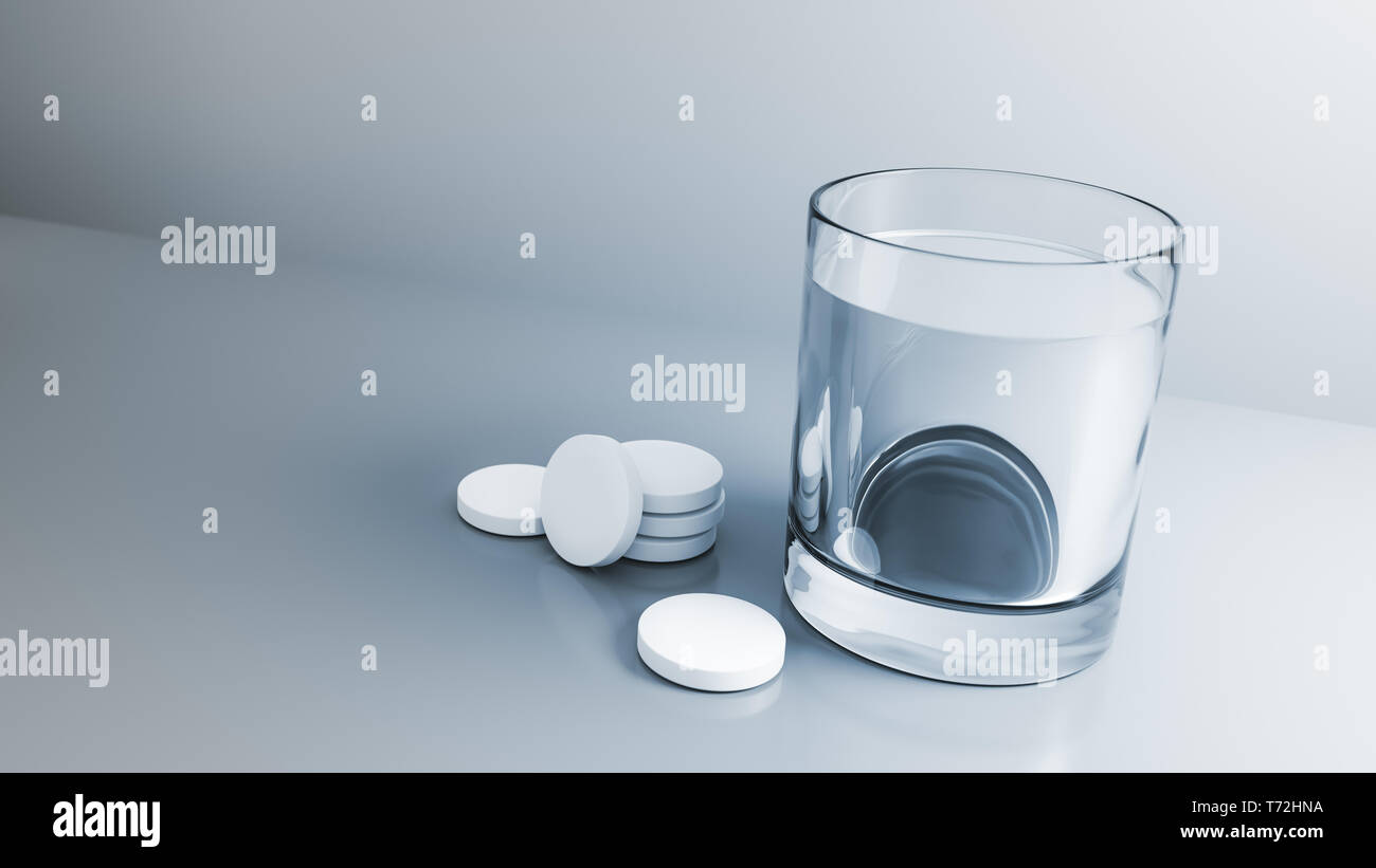 Glass of water with an effervescent tablet dissolving hi-res stock ...