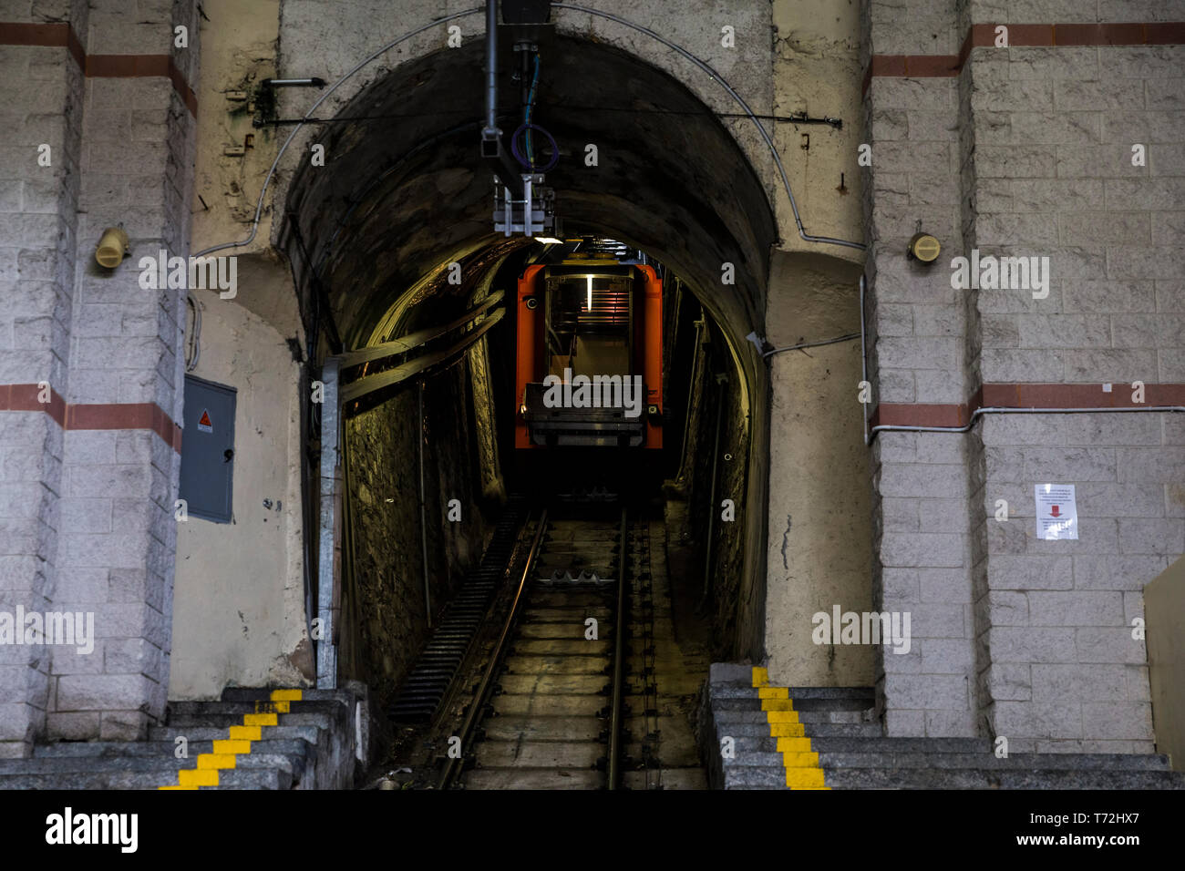 The train arrives on the Como-Brunate funicular railway in Como, Italy ...