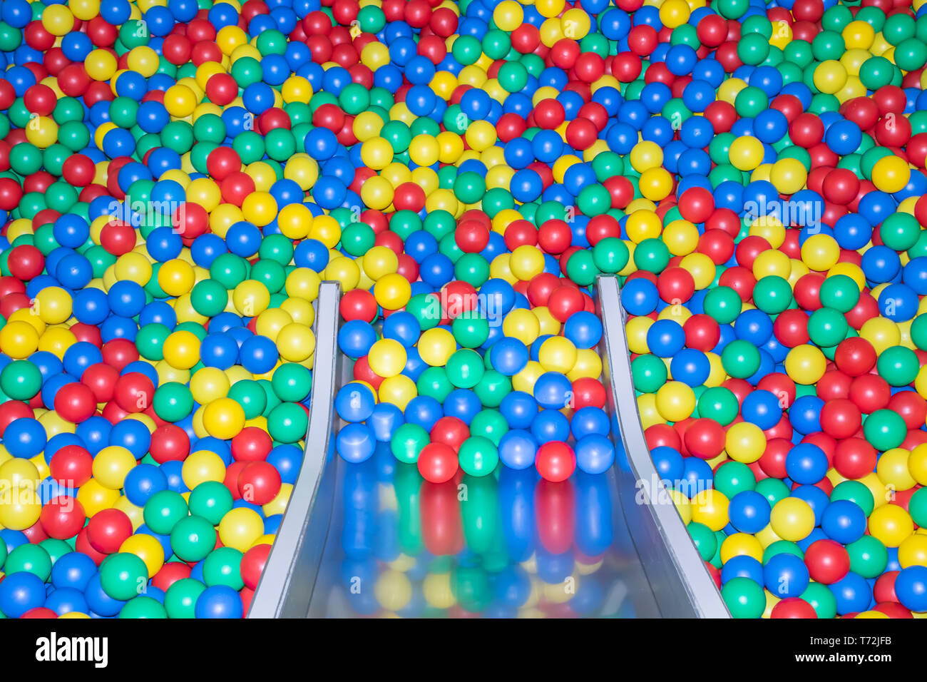 Playing children slider playground hi-res stock photography and images ...