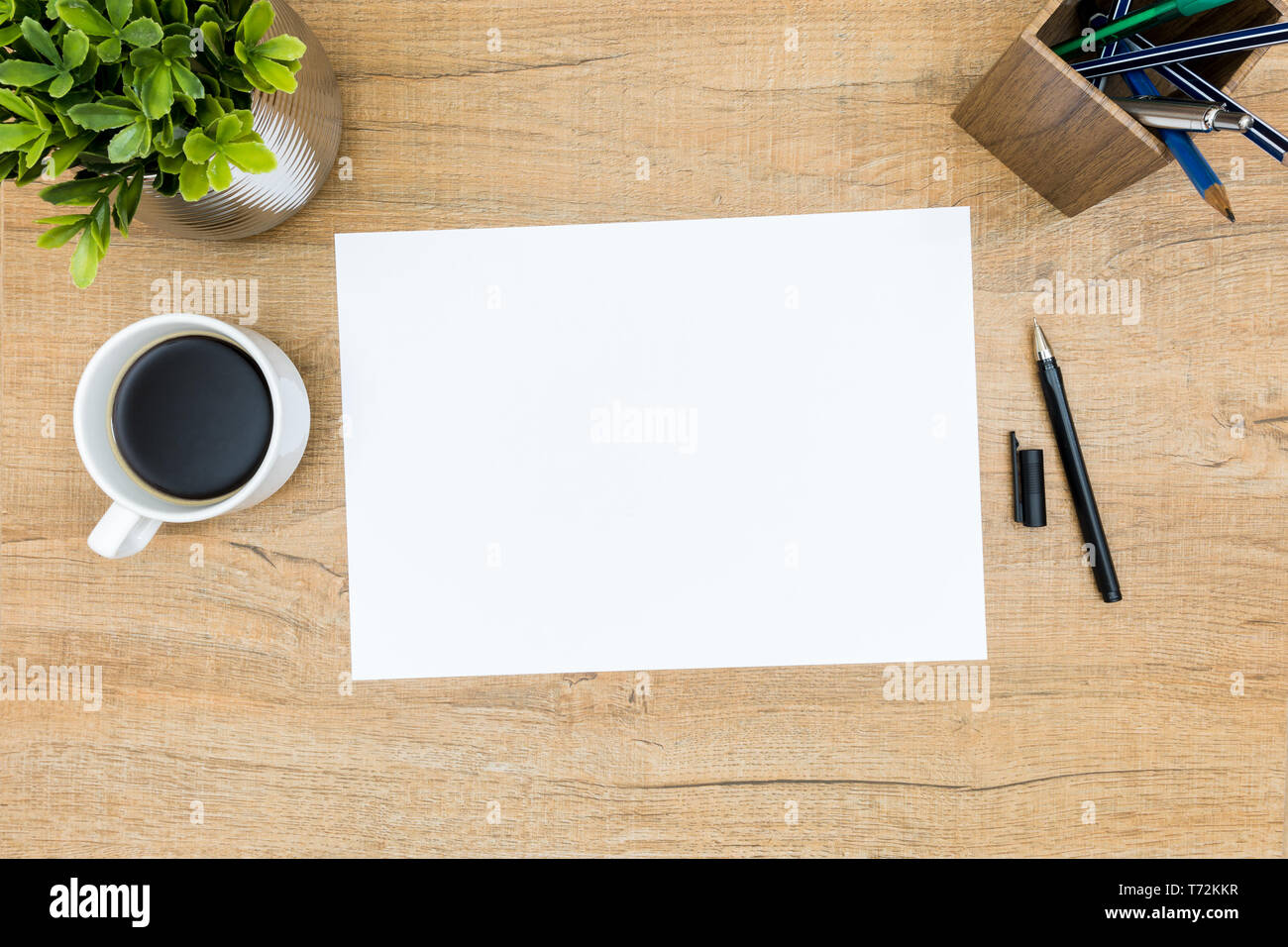 Blank paper on the business desk table. Top view, flat lay Stock Photo ...