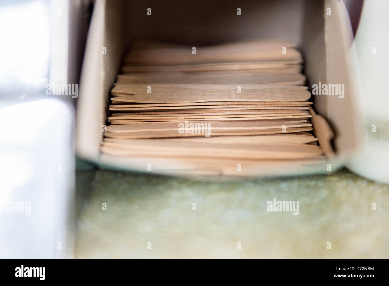 Wooden Chip shop forks on a counter at a British traditional fish and ...