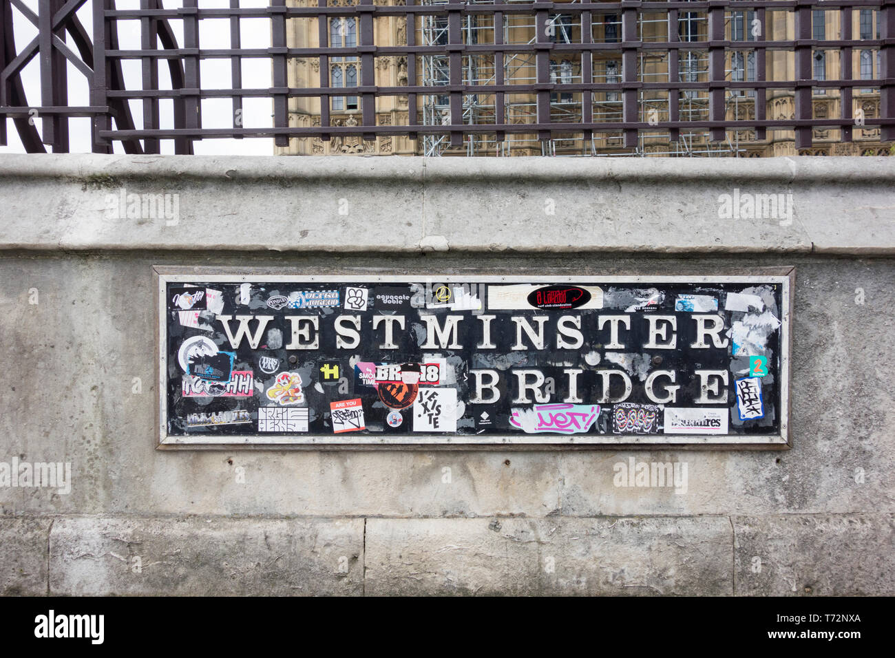 A sticker clad Westminster Bridge road sign, London, UK Stock Photo - Alamy