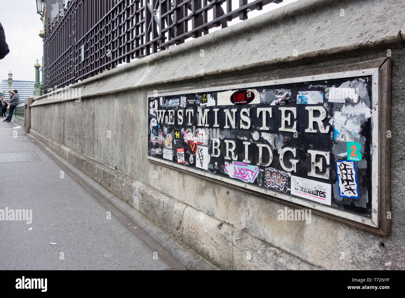 A sticker clad Westminster Bridge road sign, London, UK Stock Photo - Alamy