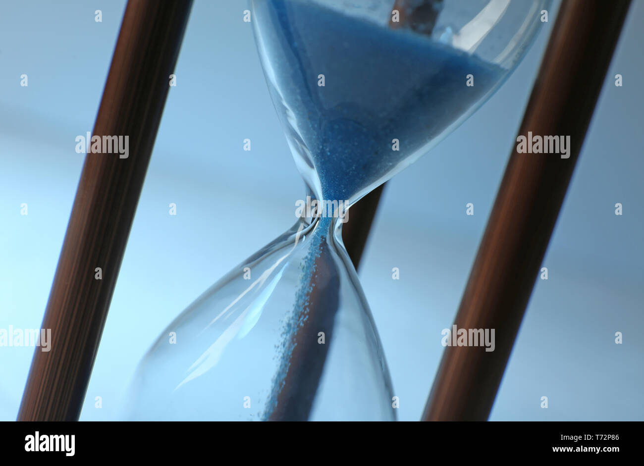 Hourglass on color background, closeup. Time management concept Stock ...