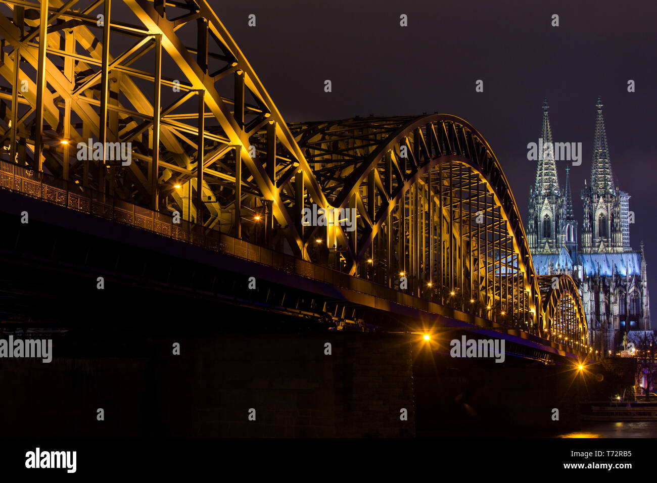 dom of cologne and hohenzollern bridge at night Stock Photo - Alamy