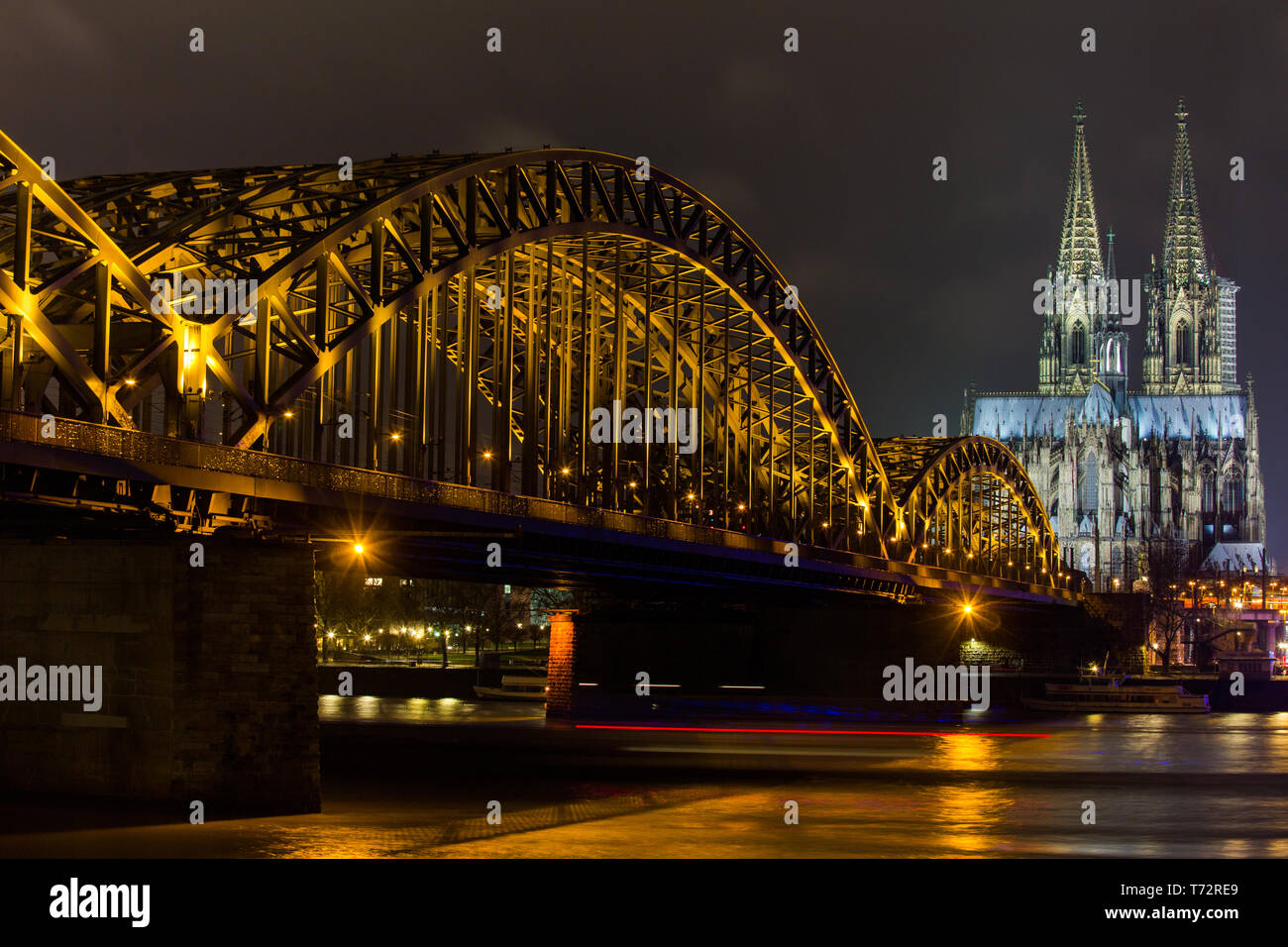 dom of cologne and hohenzollern bridge at night Stock Photo - Alamy