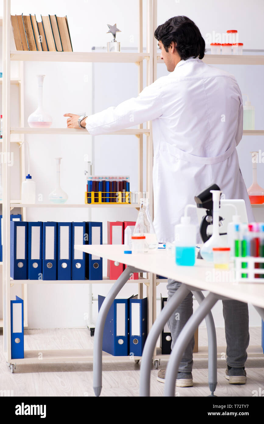 Back view chemist man in hi-res stock photography and images - Alamy