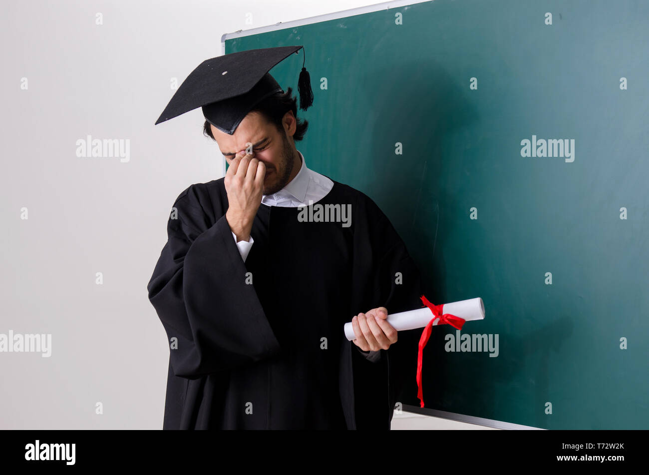 Crying graduate hi-res stock photography and images - Alamy