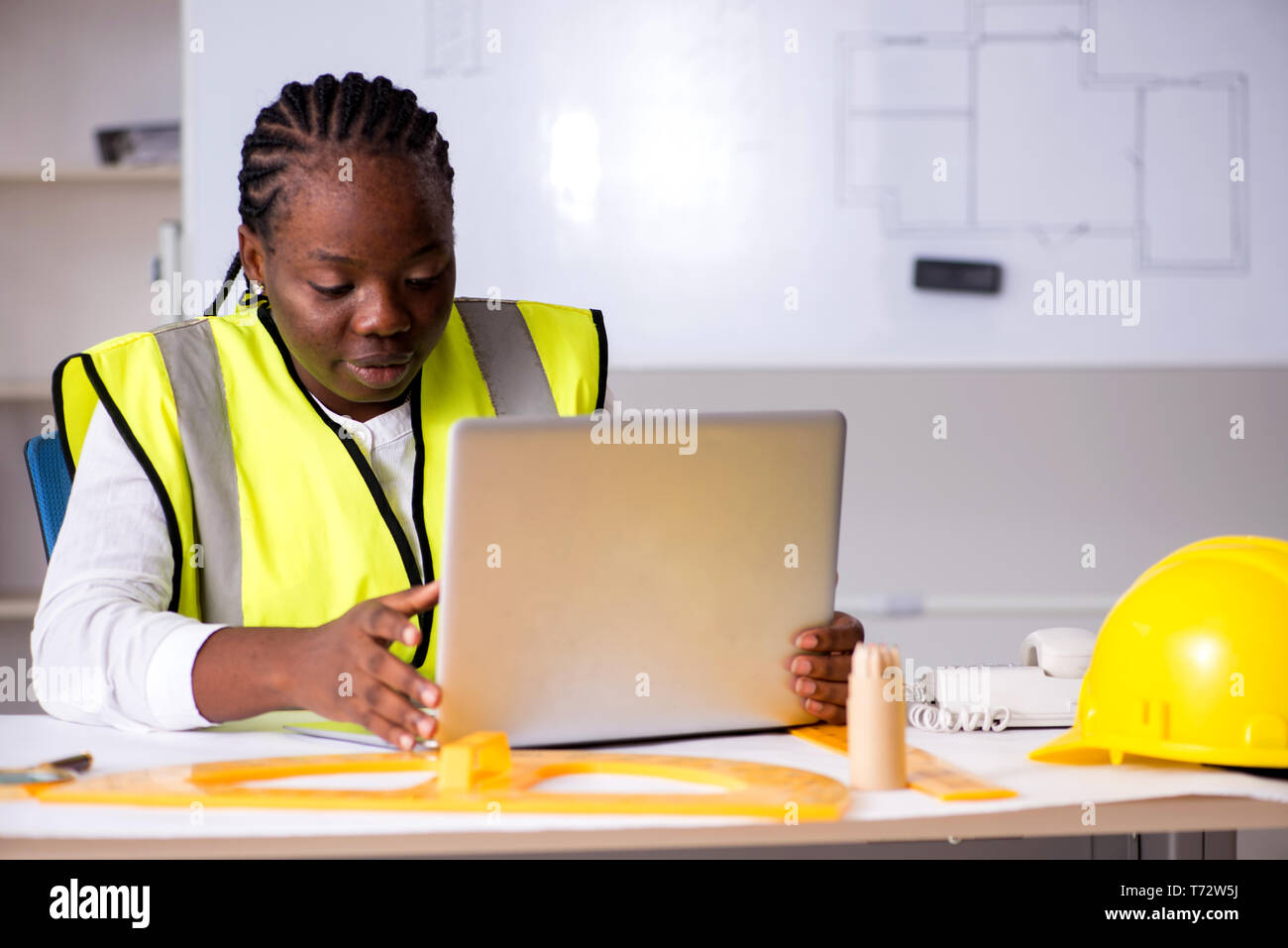 Young black architect working on project Stock Photo - Alamy