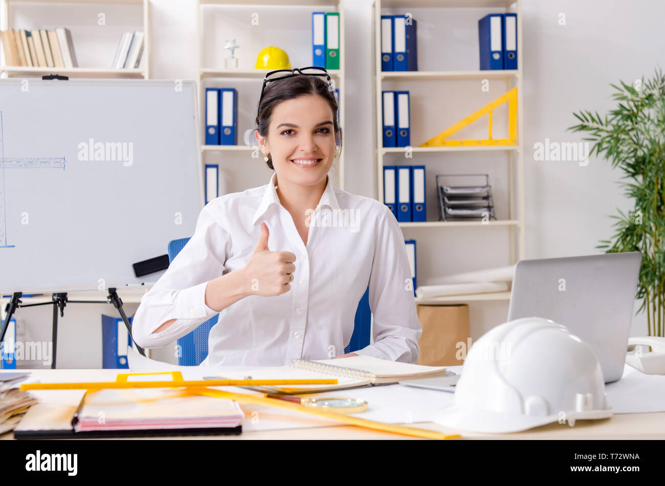 Female architect drafting blueprint ruler hi-res stock photography and ...