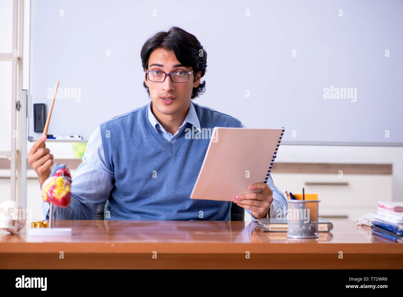 Young lecturer teacher teaching anatomy Stock Photo - Alamy