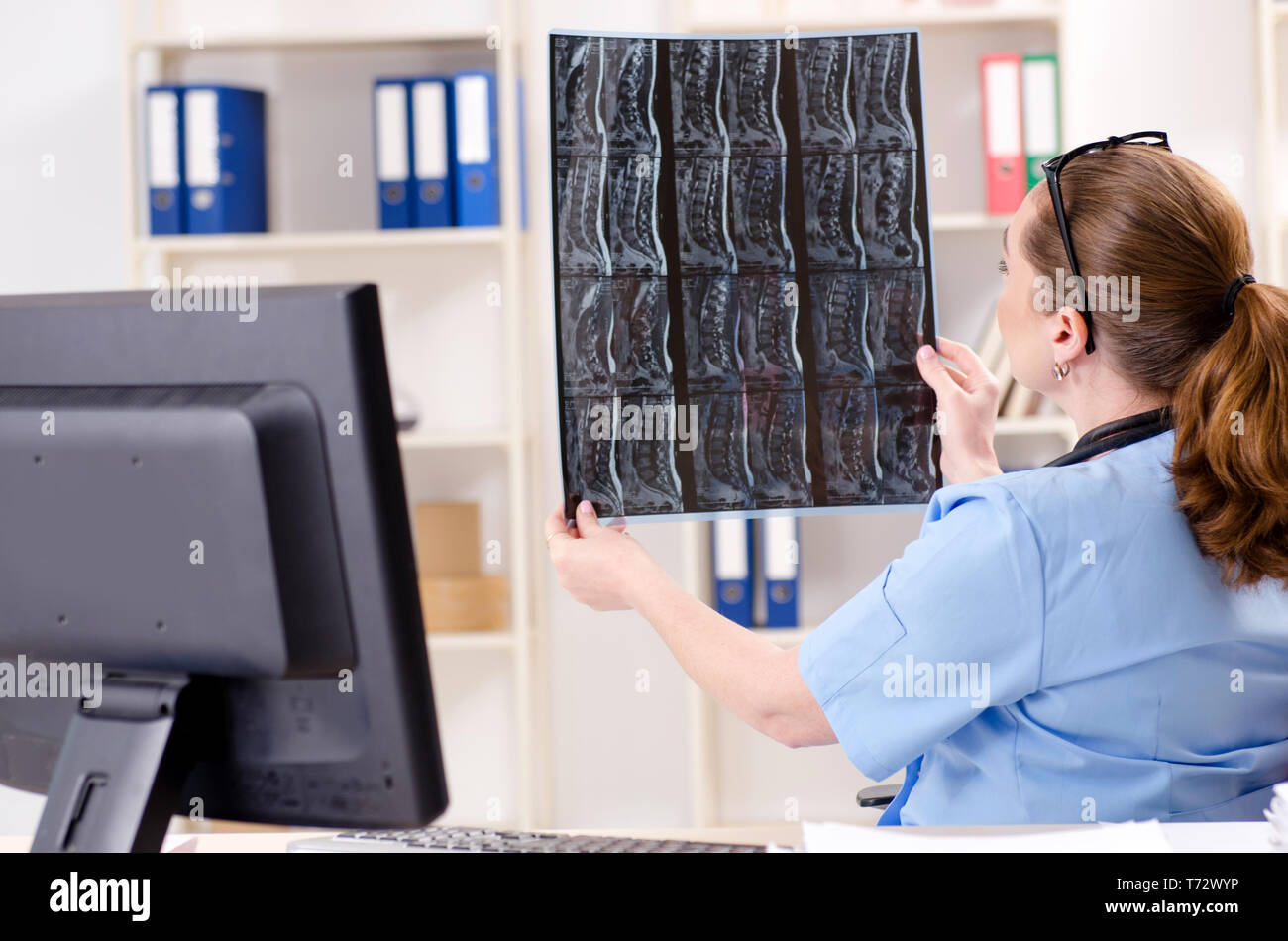 Female doctor radiologist working in the clinic Stock Photo - Alamy