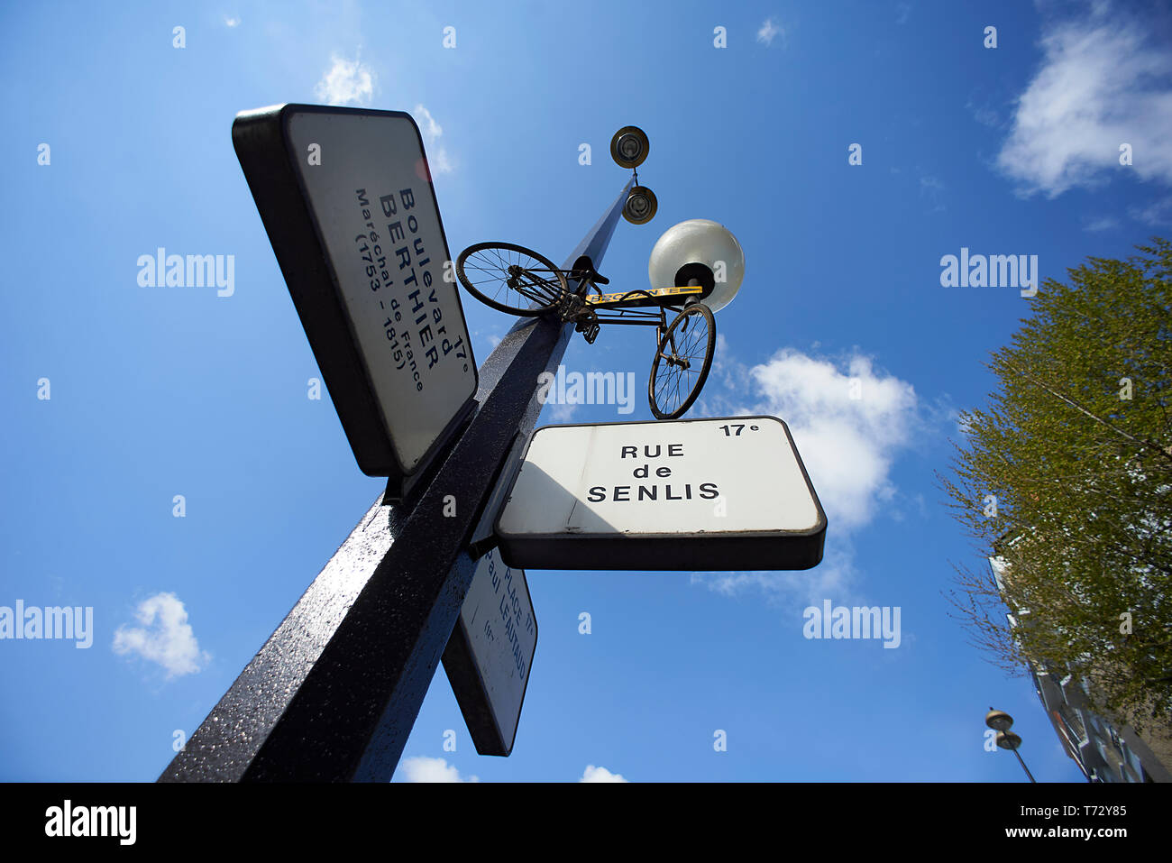 Typical street signage in the city centre of Paris in summer sunshine ...