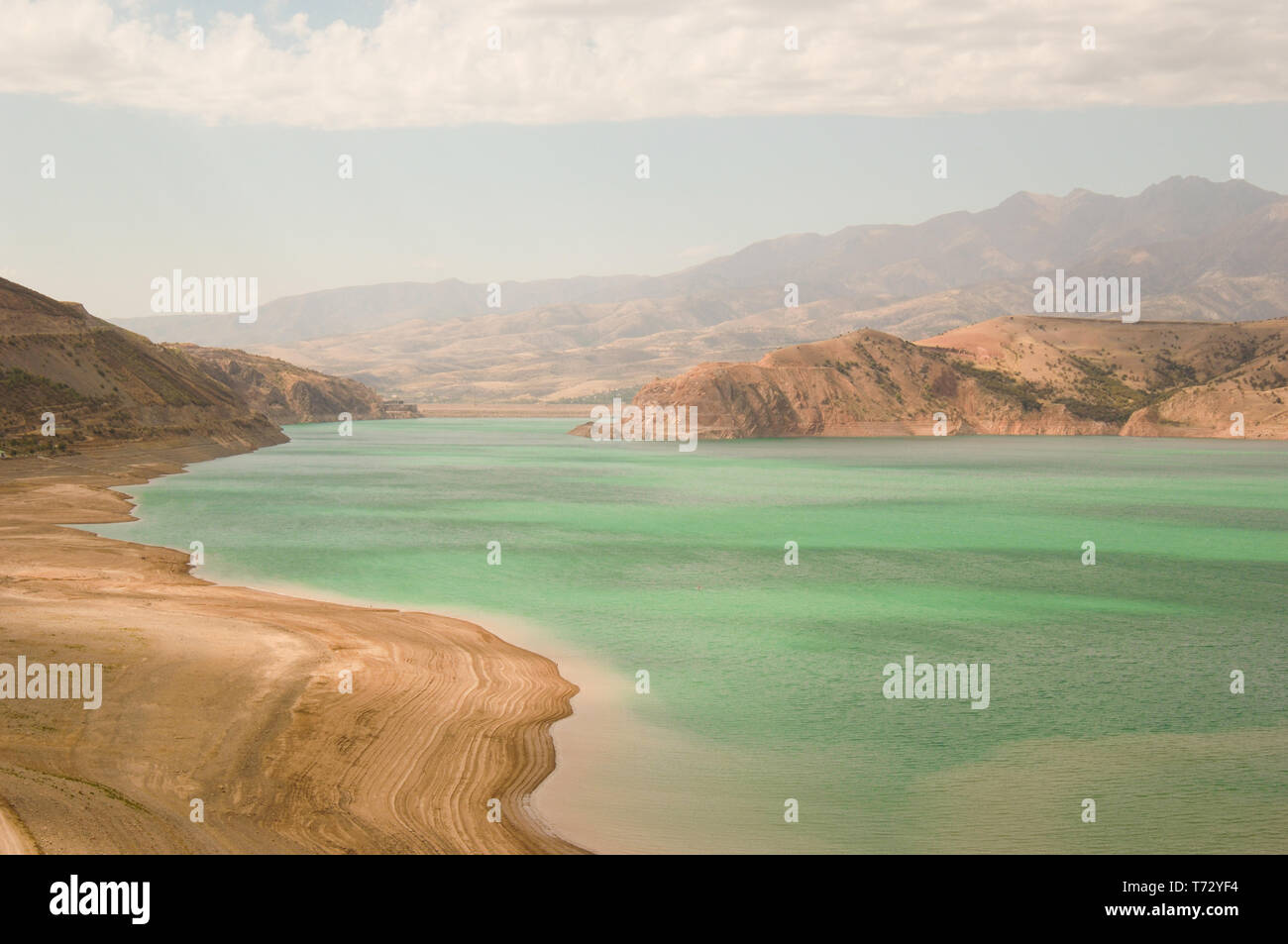 landscape with lake and mountain views. Uzbekistan, Charvak reservoir ...