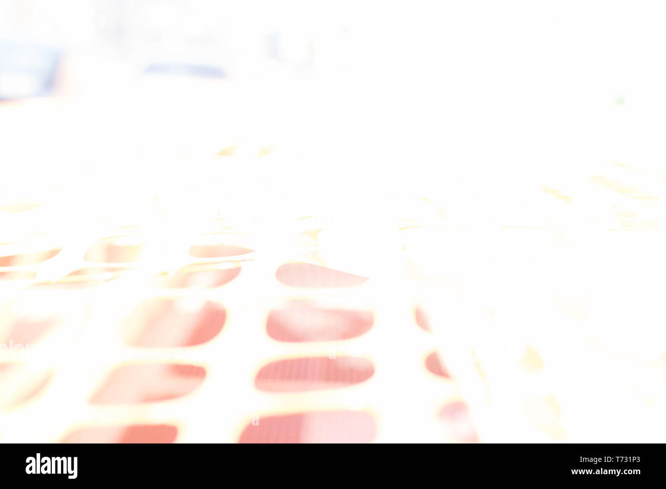 Abstract light pattern and faded orange patches Stock Photo - Alamy