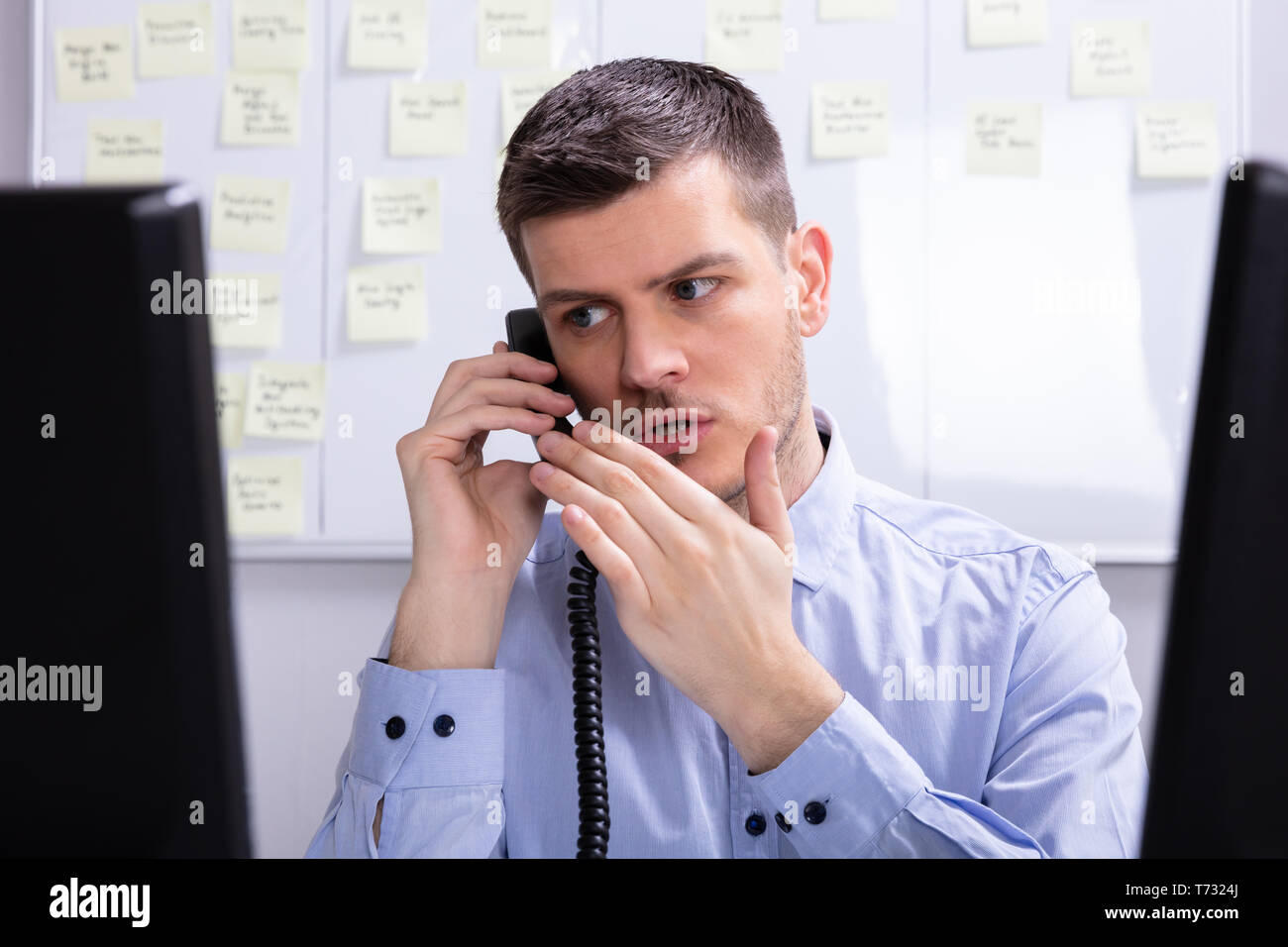 Employee computer sneaky hi-res stock photography and images - Alamy