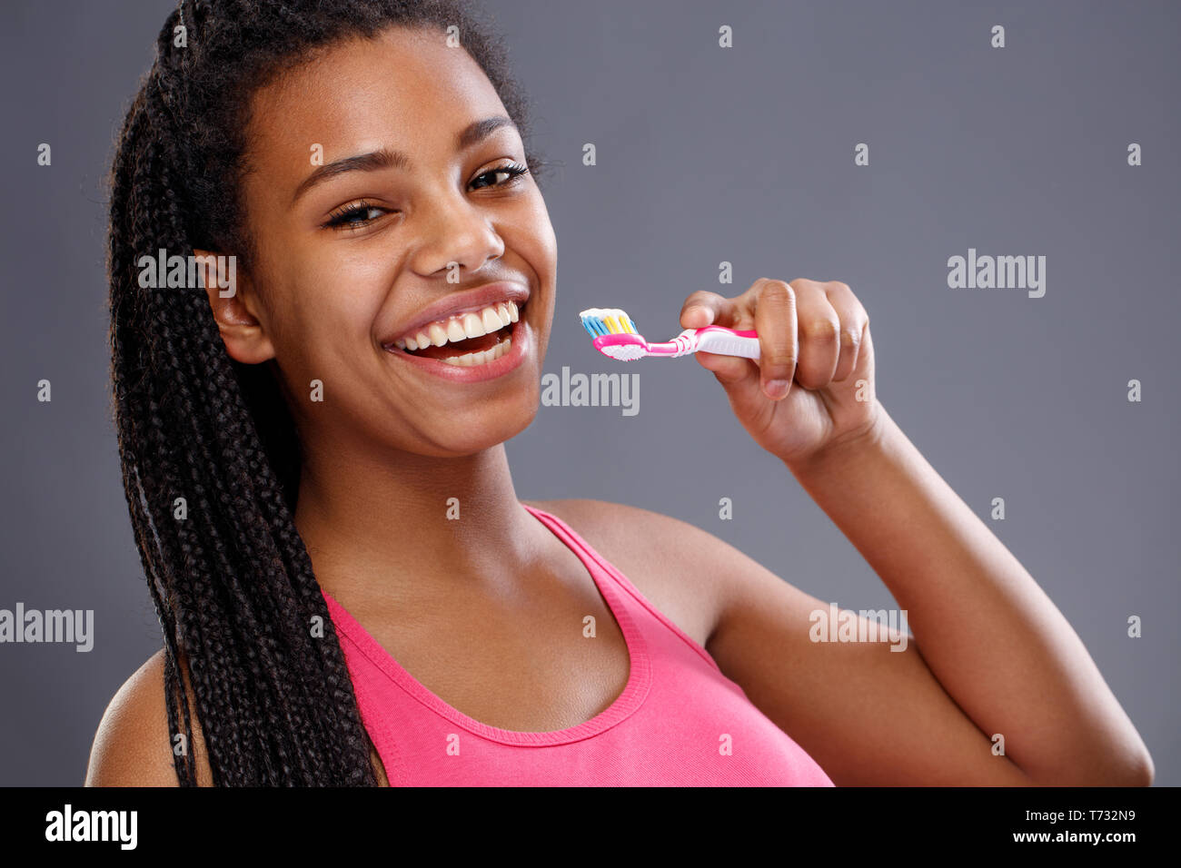 Young girl take care about teeth with toothbrush Stock Photo - Alamy