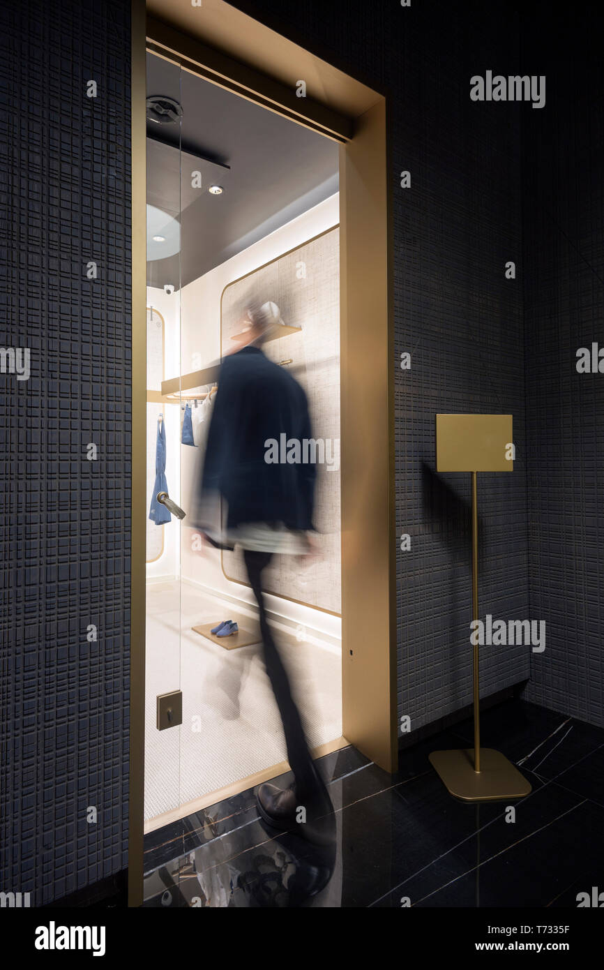 Man entering in a store Stock Photo - Alamy